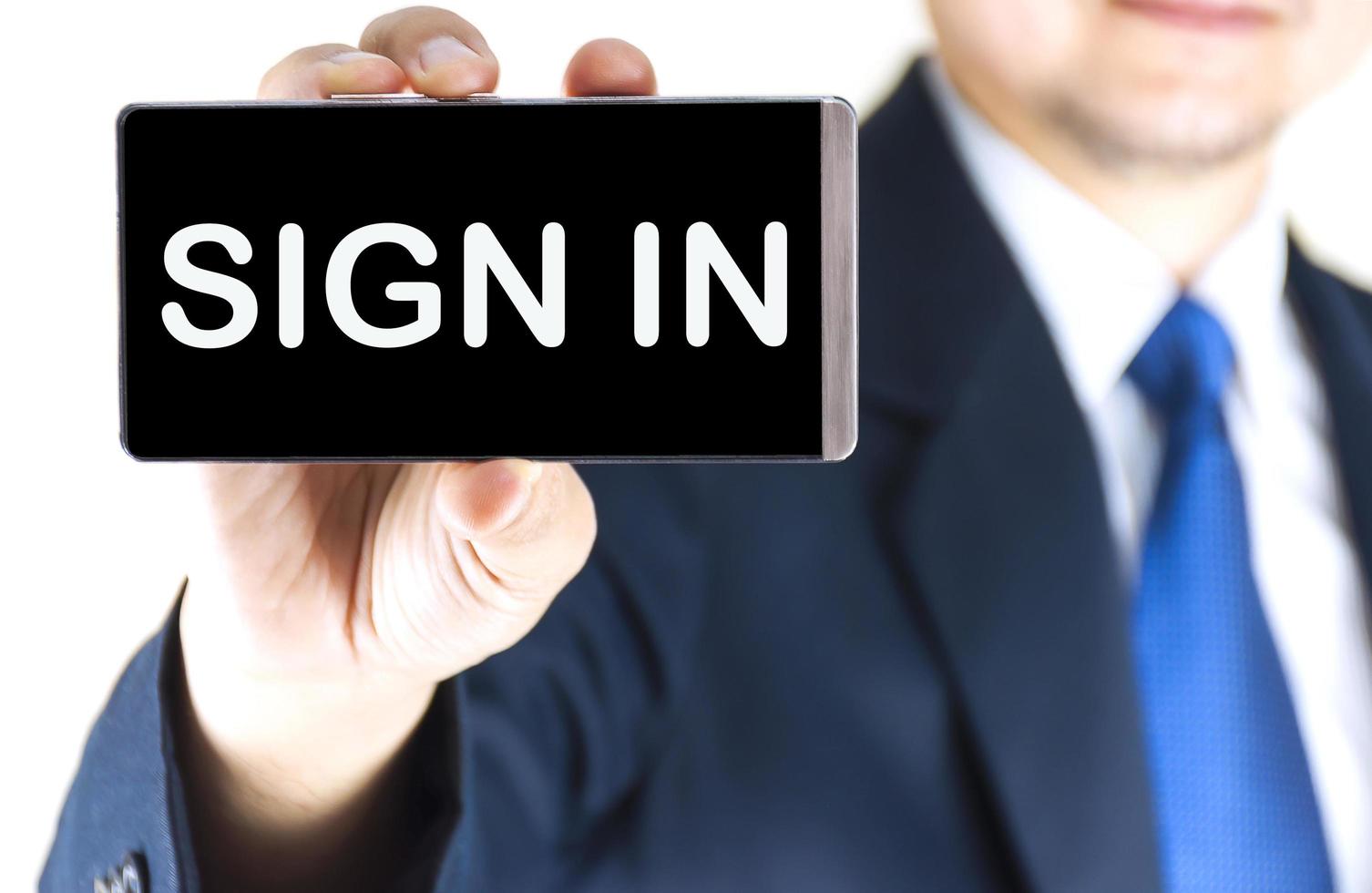 SIGN IN Word On Mobile Phone Screen In Blurred Young Businessman Hand sign-in-word-on-mobile-phone-screen-in-blurred-young-businessman-hand