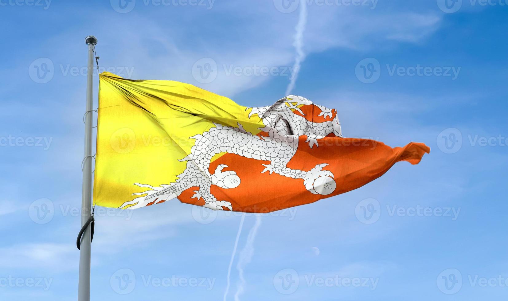 Bhutan flag - realistic waving fabric flag. 9404873 Stock Photo at Vecteezy