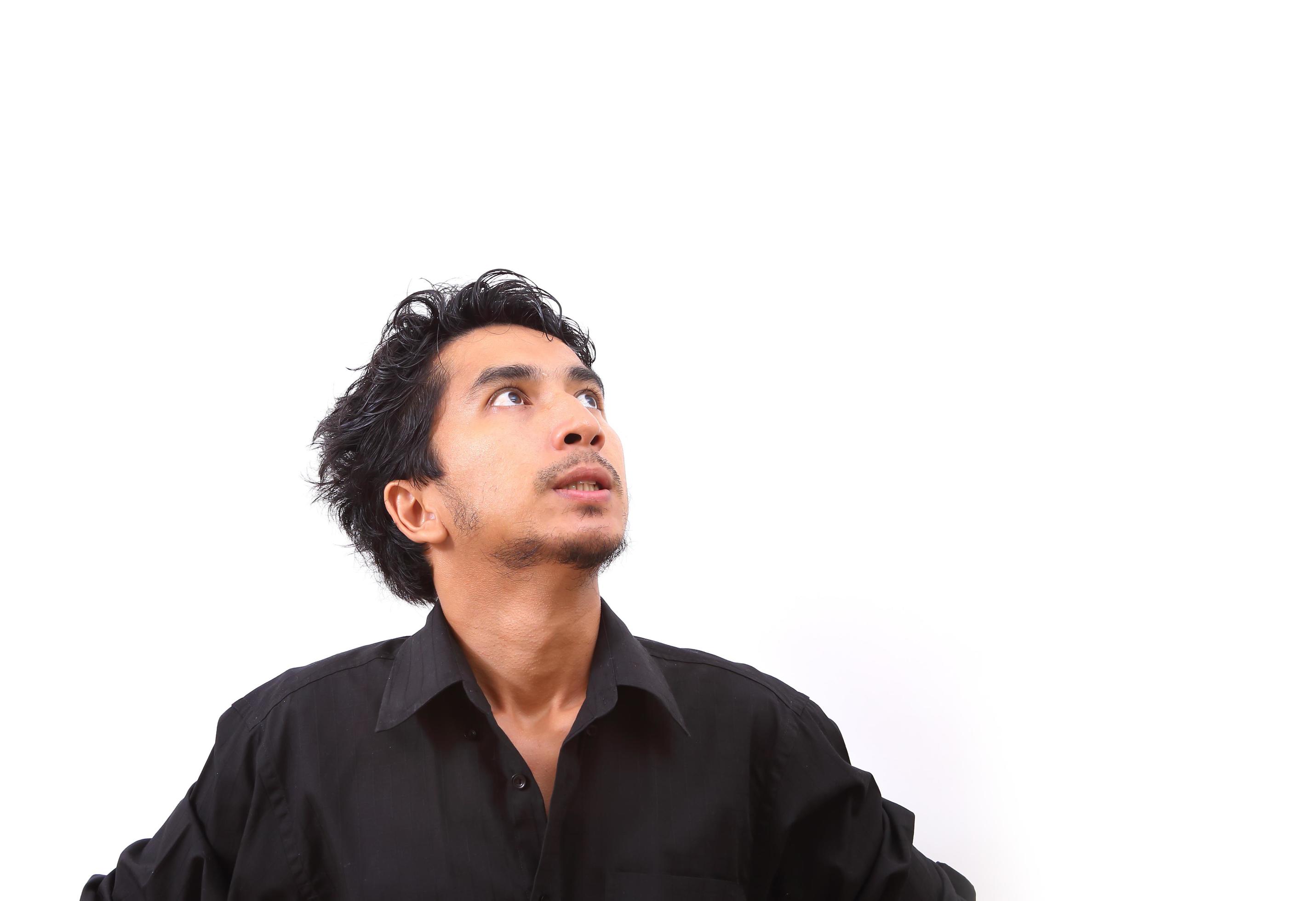 Young man furious over white background 9566623 Stock Photo at Vecteezy