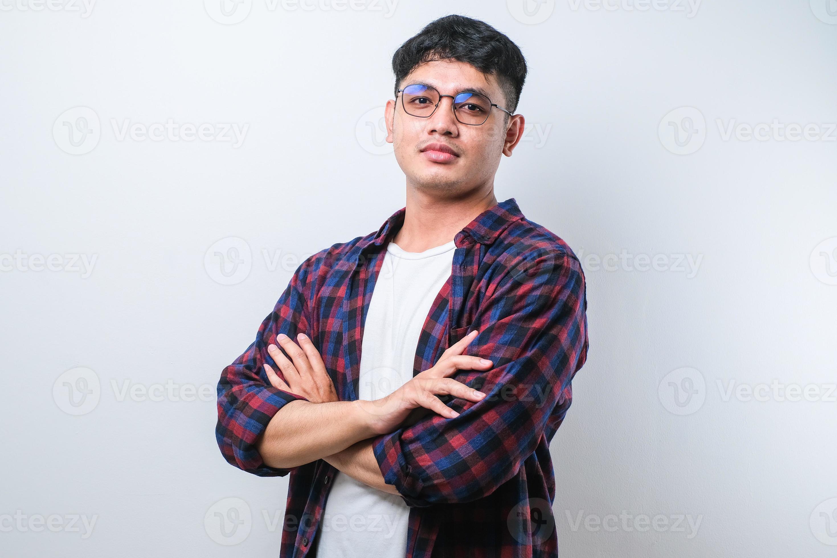 Portrait Of Young Handsome Asian Man Wearing Casual Shirt And Glasses