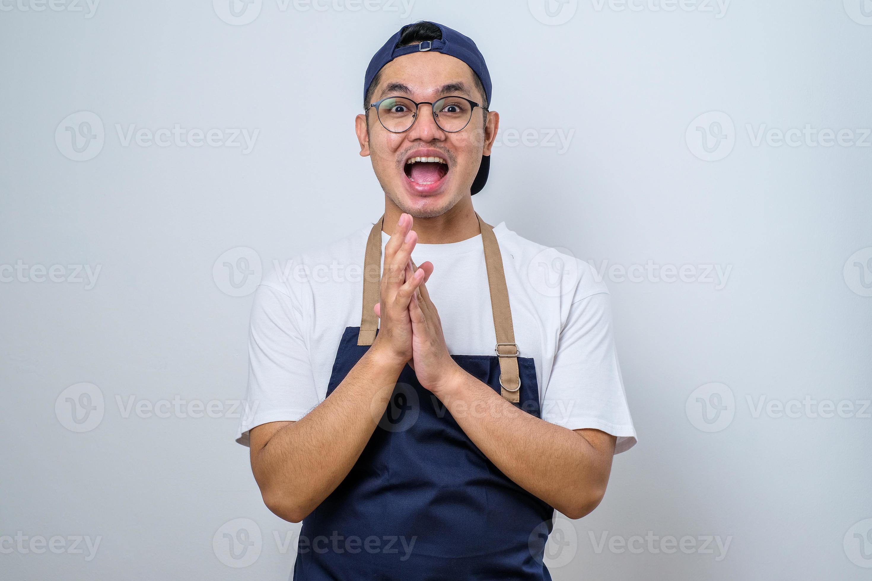 Young Asian Barista Man Wearing Apron Clapping And Applausing Happy And