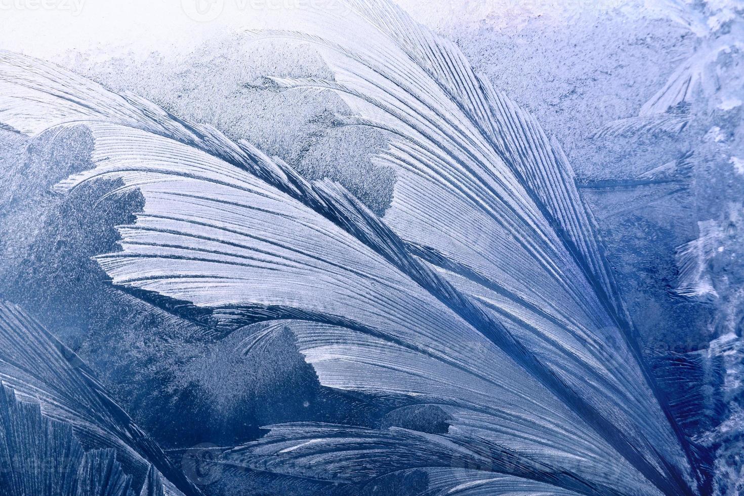 Hoar frost on the frozen window. 9899212 Stock Photo at Vecteezy