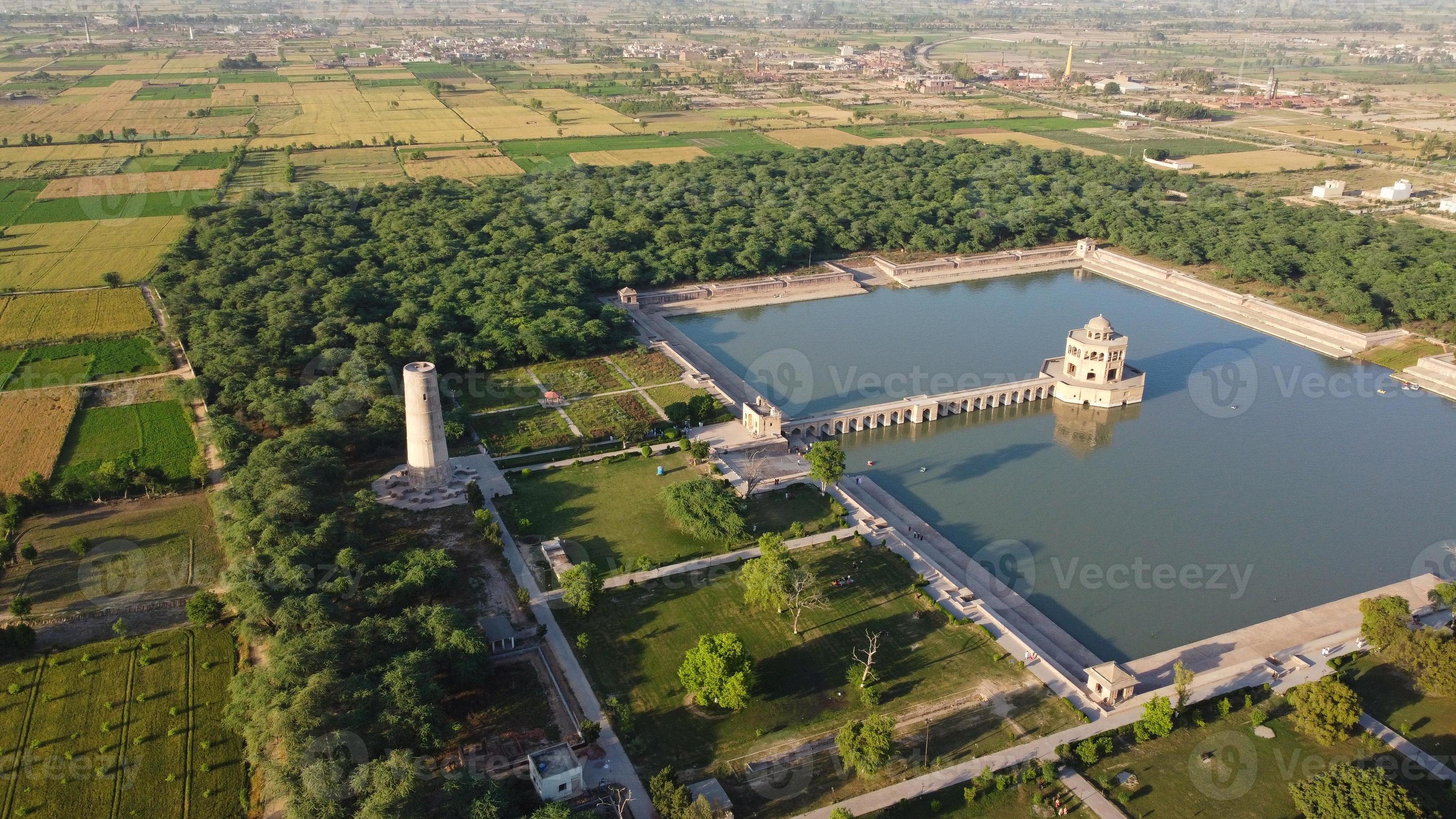 High Angle Aerial View of Historical Mughals Hiran Minar and village of Sheikhupura Pakistan ...