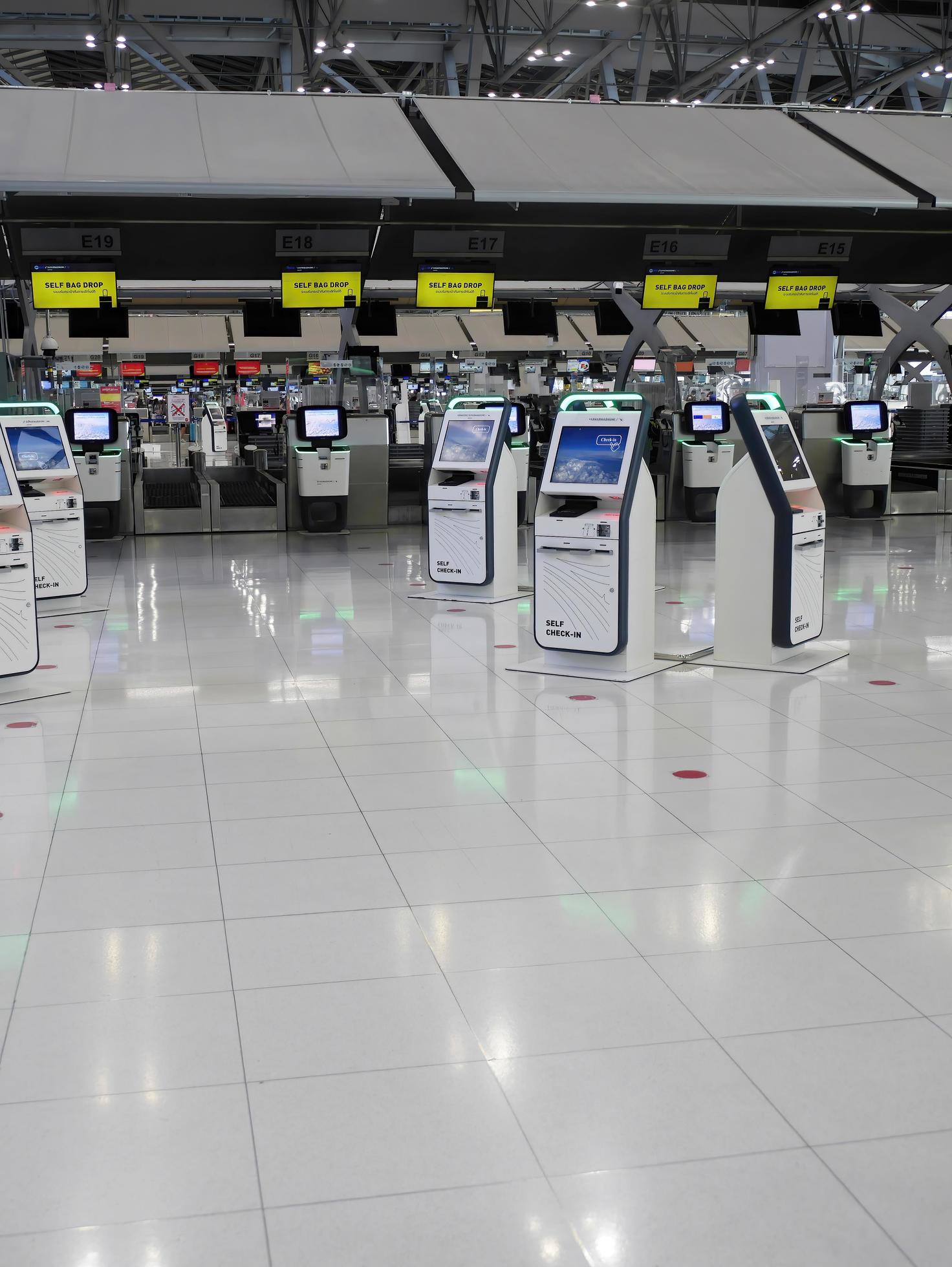 Self check in machine hall and help desk kiosk at airport for check in ... Self check in machine hall and help desk kiosk at airport for check in ...