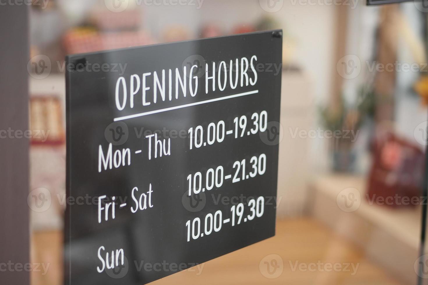 Opening Hours Sign Stock Photos, Images and Backgrounds for Free Download