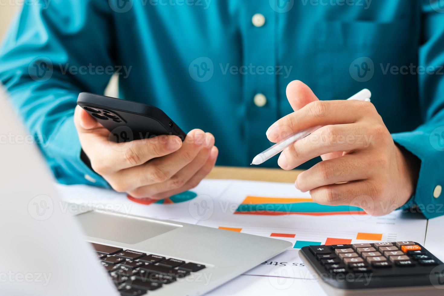 businessman working using mobile phones and laptop computers Liaise ...