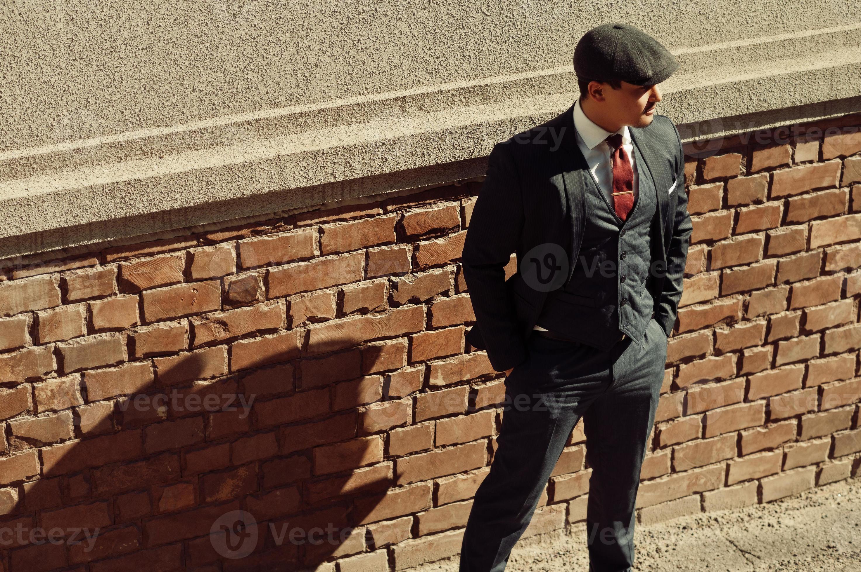Portrait of retro 1920s english arabian business man wearing dark suit ...