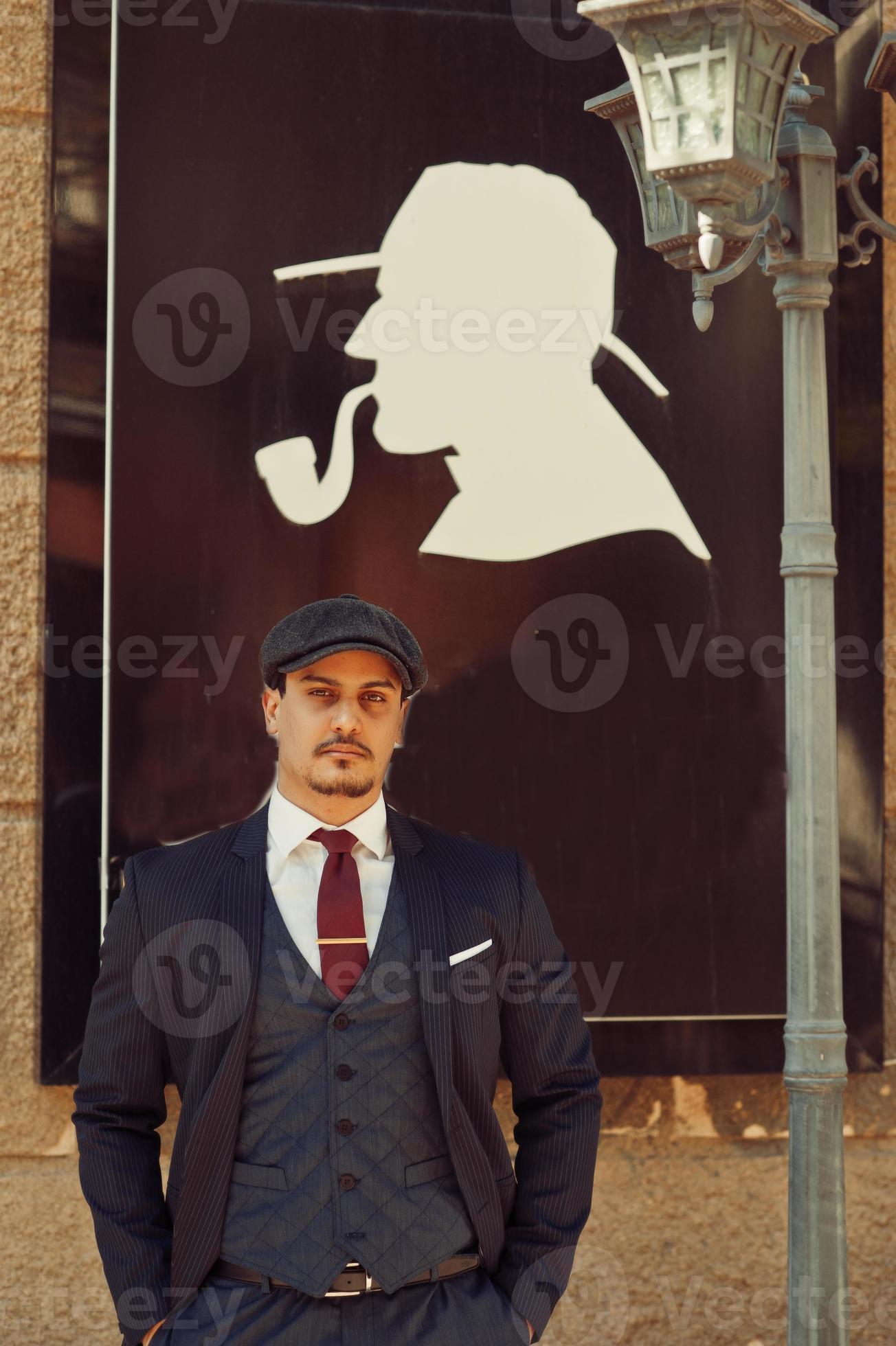 Portrait of retro 1920s english arabian business man wearing dark suit ...