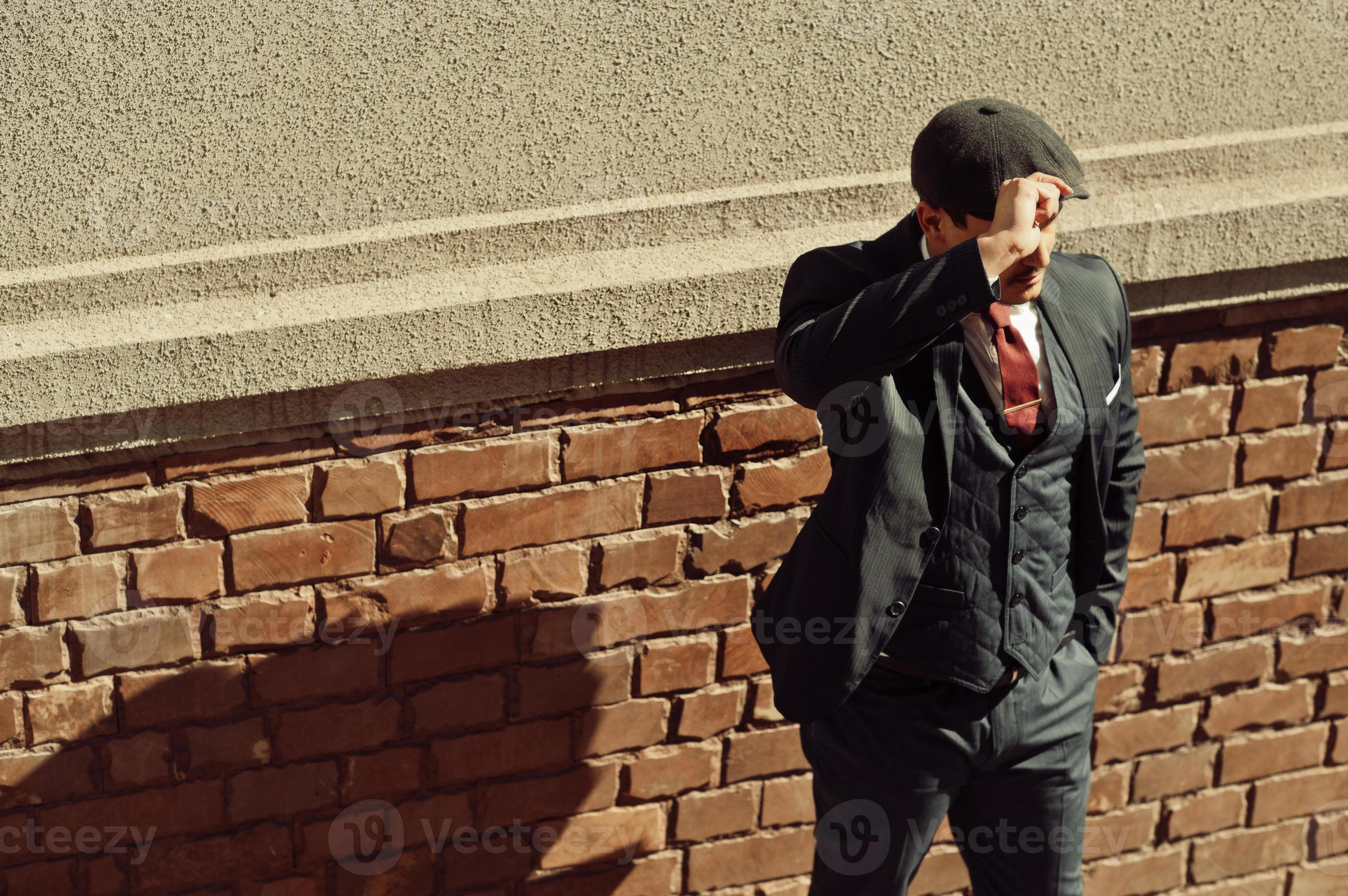 Portrait of retro 1920s english arabian business man wearing dark suit ...