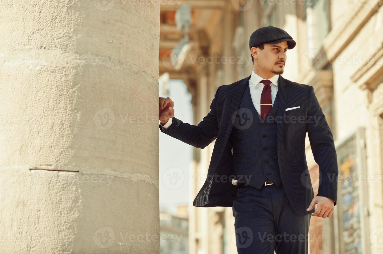 Portrait of retro 1920s english arabian business man wearing dark suit ...