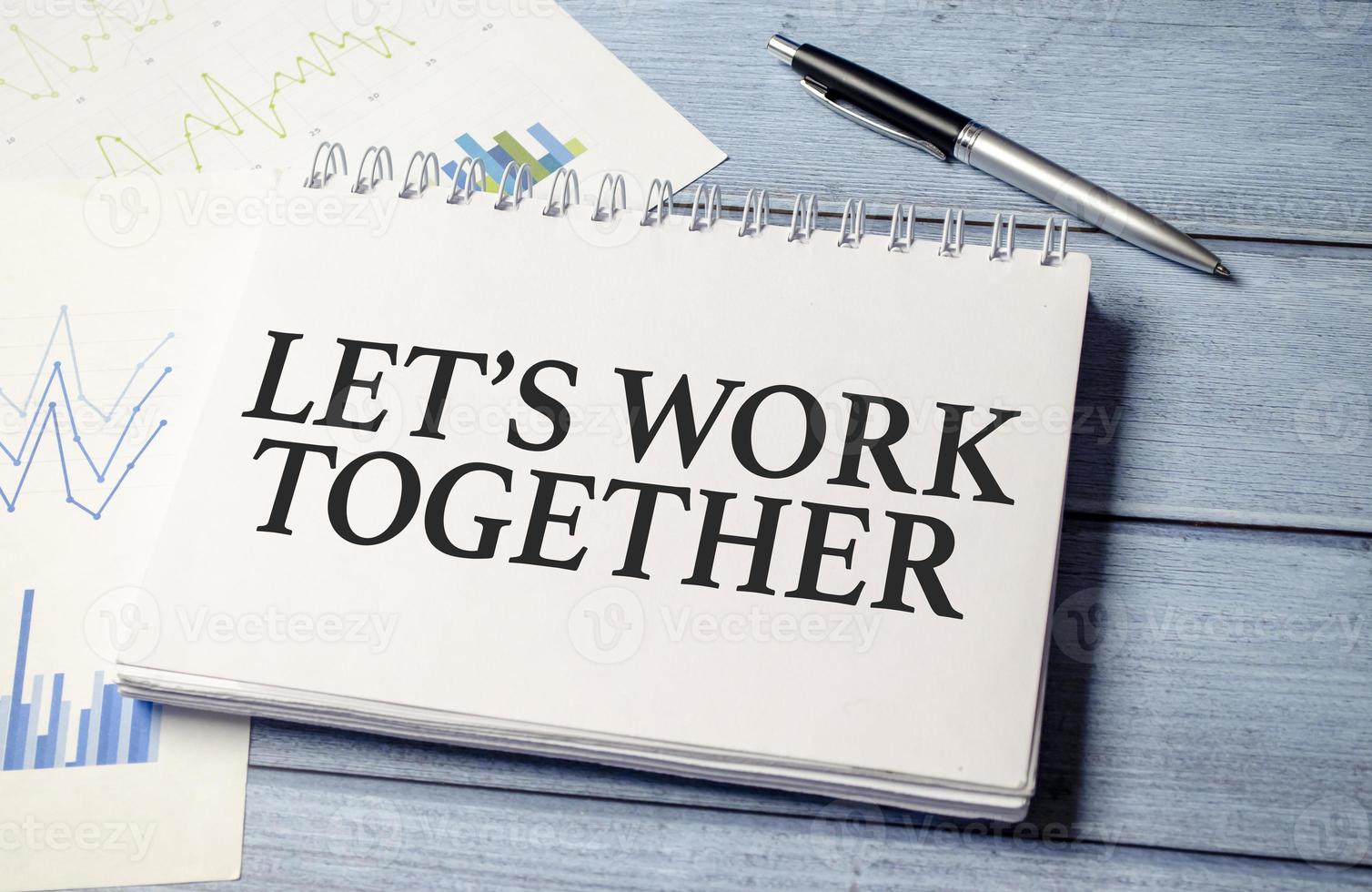 let's work together word on paper sheet and wooden background 10540872 ... let's work together word on paper sheet and wooden background 10540872 ...