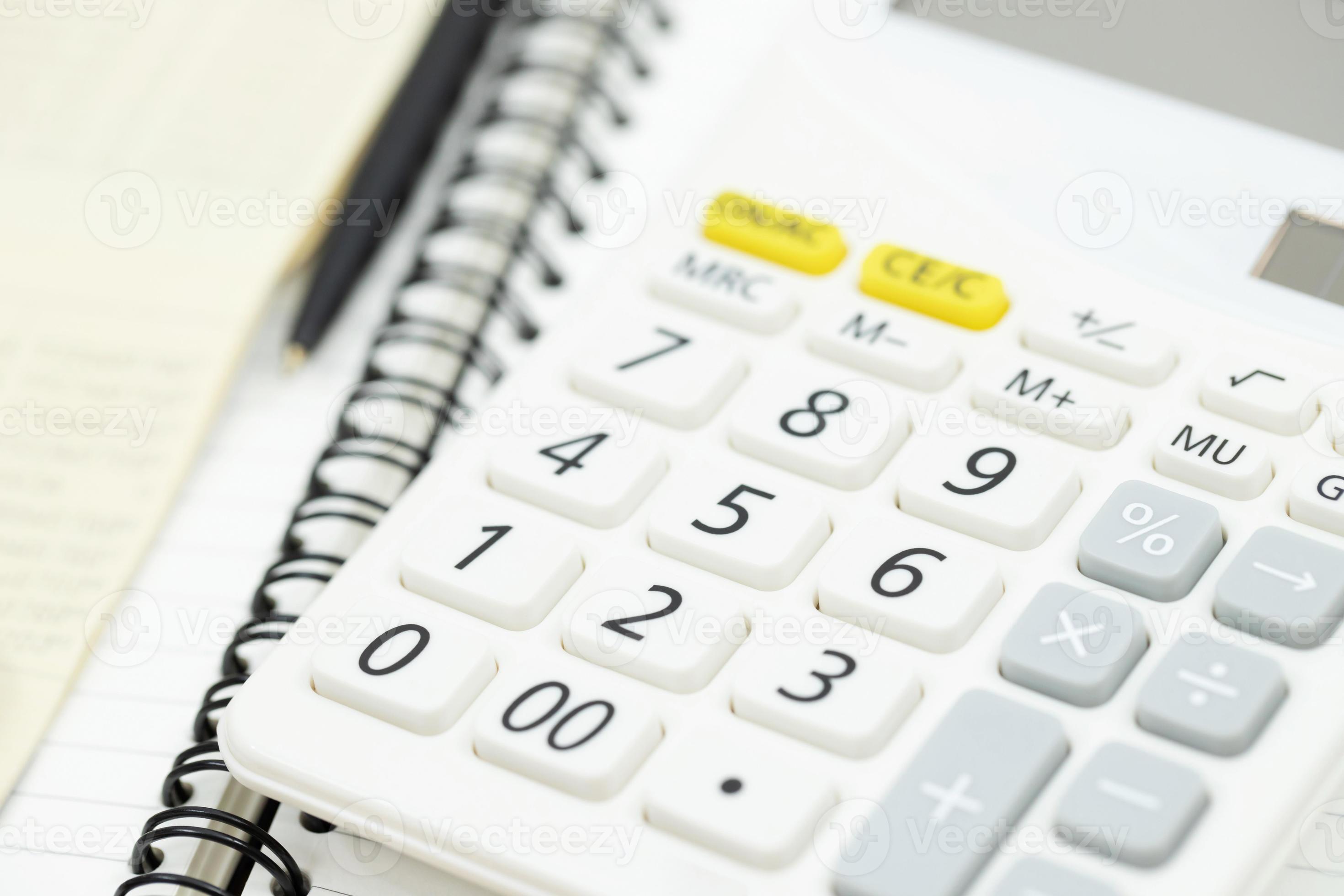 Office desk table calculator with notepad book, bank account and black ...