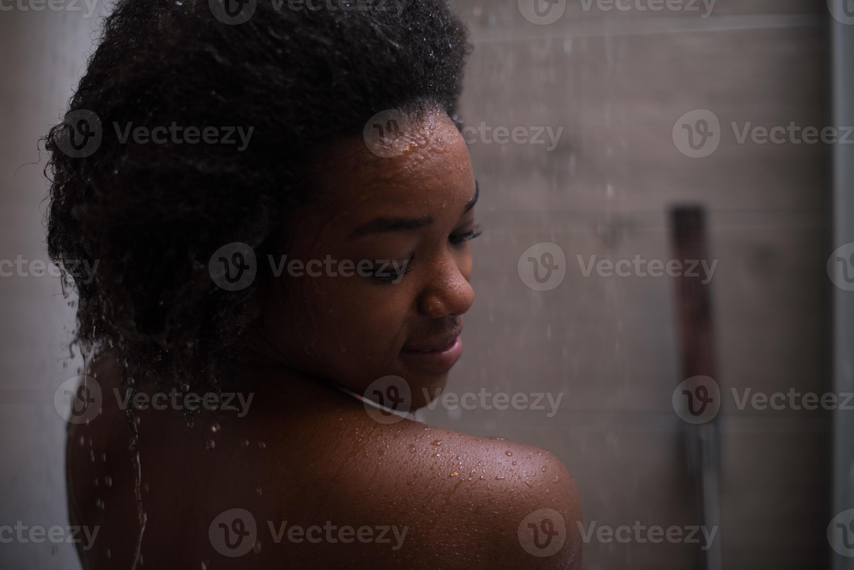 African American woman in the shower 10662410 Stock Photo at Vecteezy
