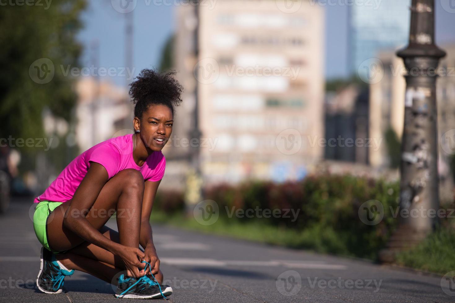 African american woman runner tightening shoe lace 10667761 Stock Photo ... African american woman runner tightening shoe lace 10667761 Stock Photo ...