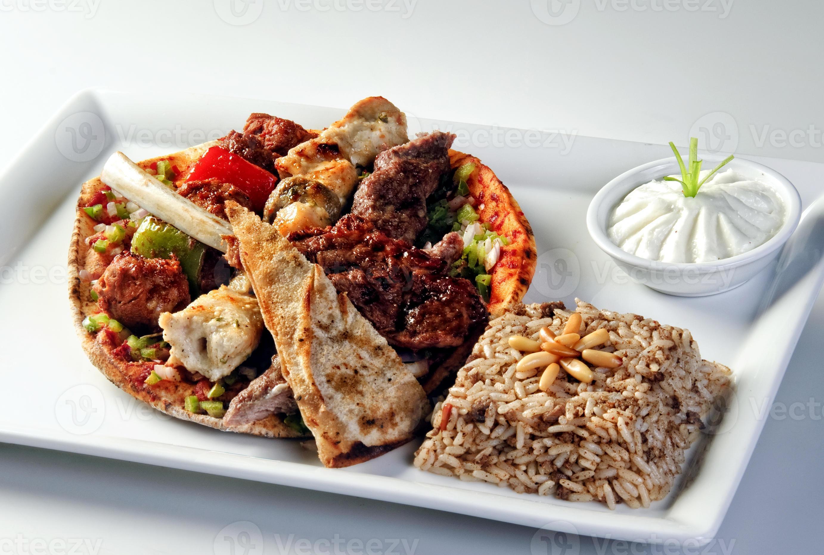 Delicious Arabic cuisine, mandi rice served with lamb meat - lahm at an ...