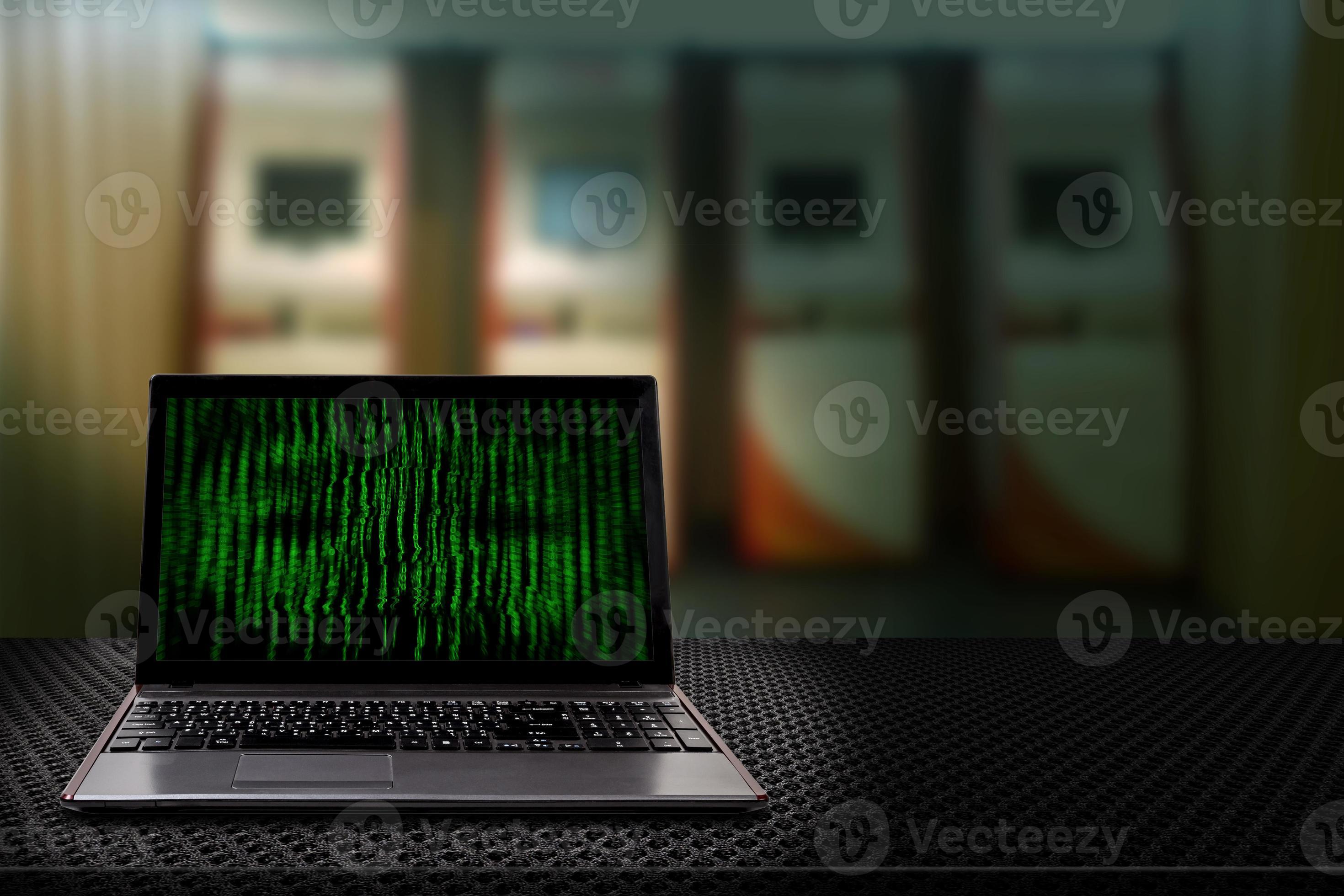 Computer with binary codes from monitor with Automatic Teller Machine ...