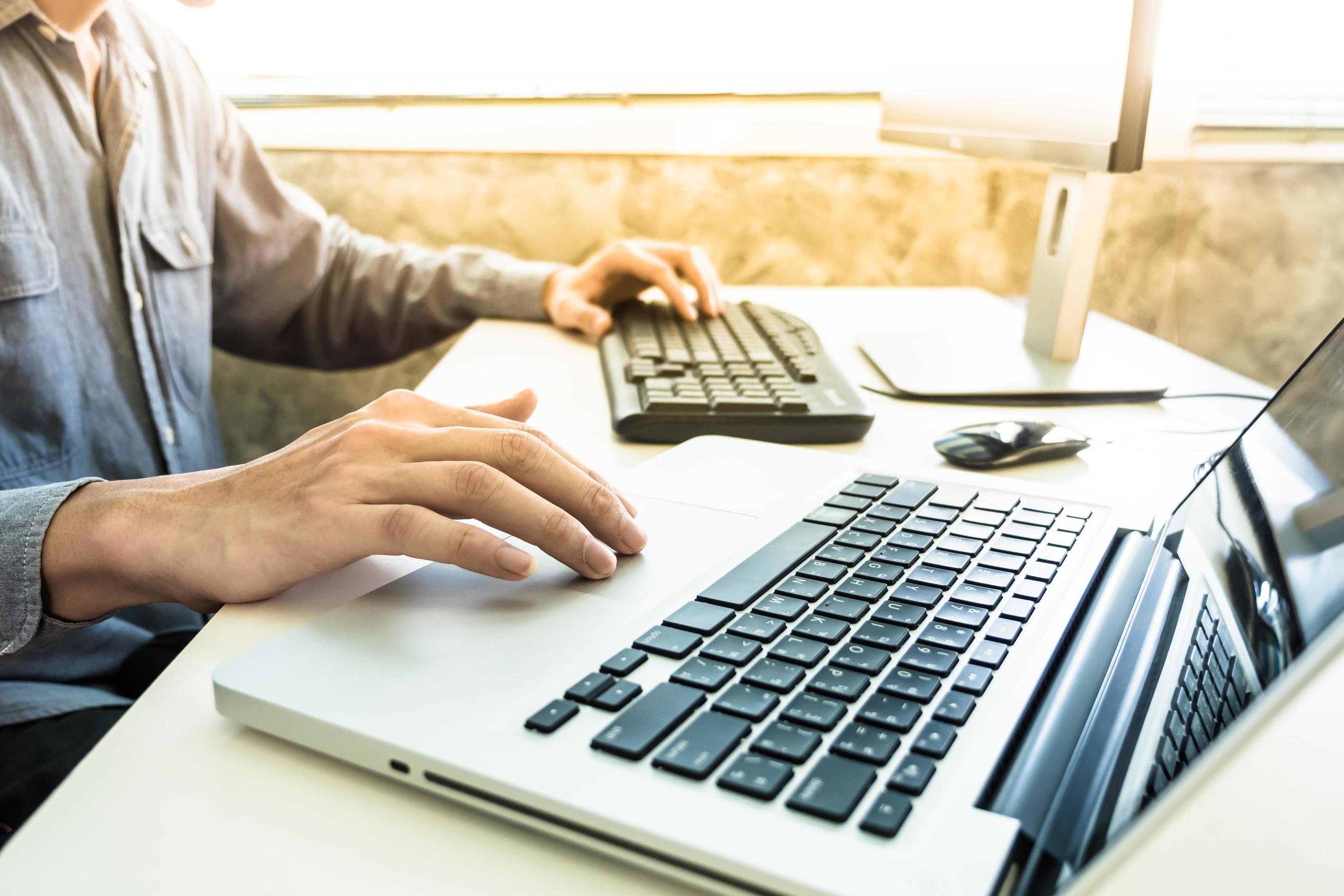 Male hands working on computer, Software programming web development ...