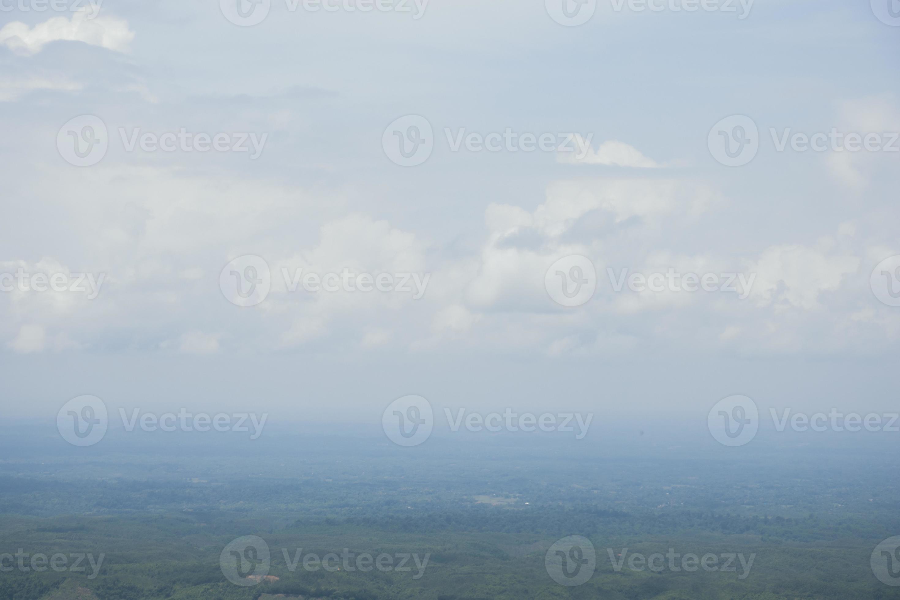 Aerial landscape view with a drone of meadow and cloudy sky horizon. Beautiful natural view of ...