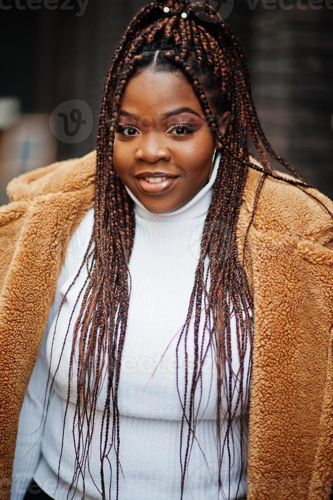 Glamorous African American Woman In Warm Fur Coat Pose At Street