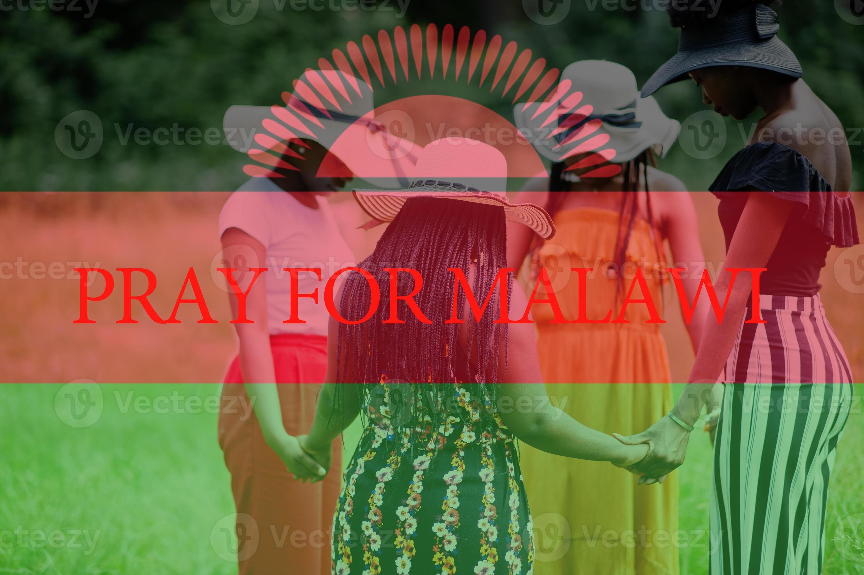 Pray for Nigeria. Group of four african women holding hands and praying. Concept of crisis in ...
