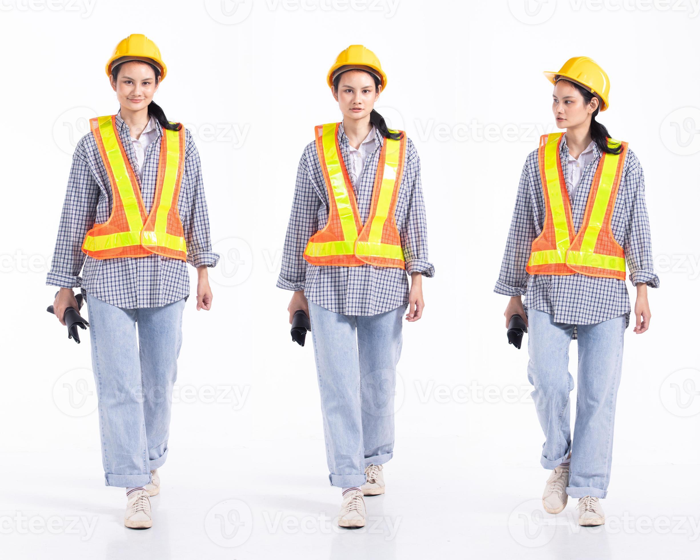 Full length 20s young Mix Race engineer contractor Woman, walking forward left right, wear ...