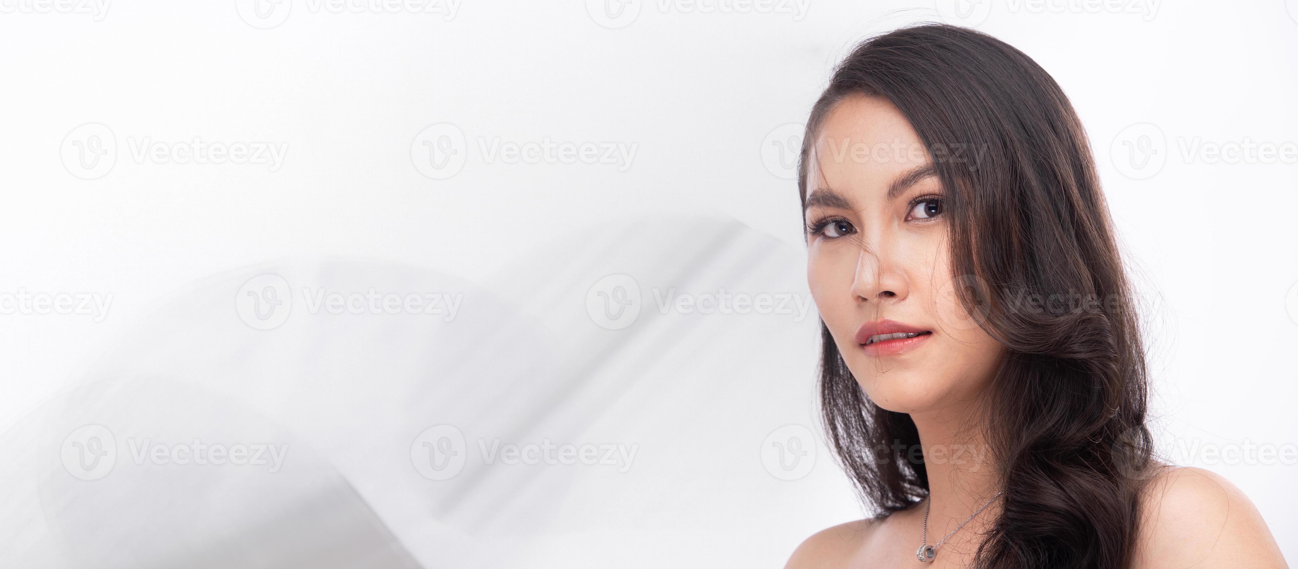 Half body Face of Asian Arab Indian tanned skin woman shows beautiful smile happy eyes lips ...