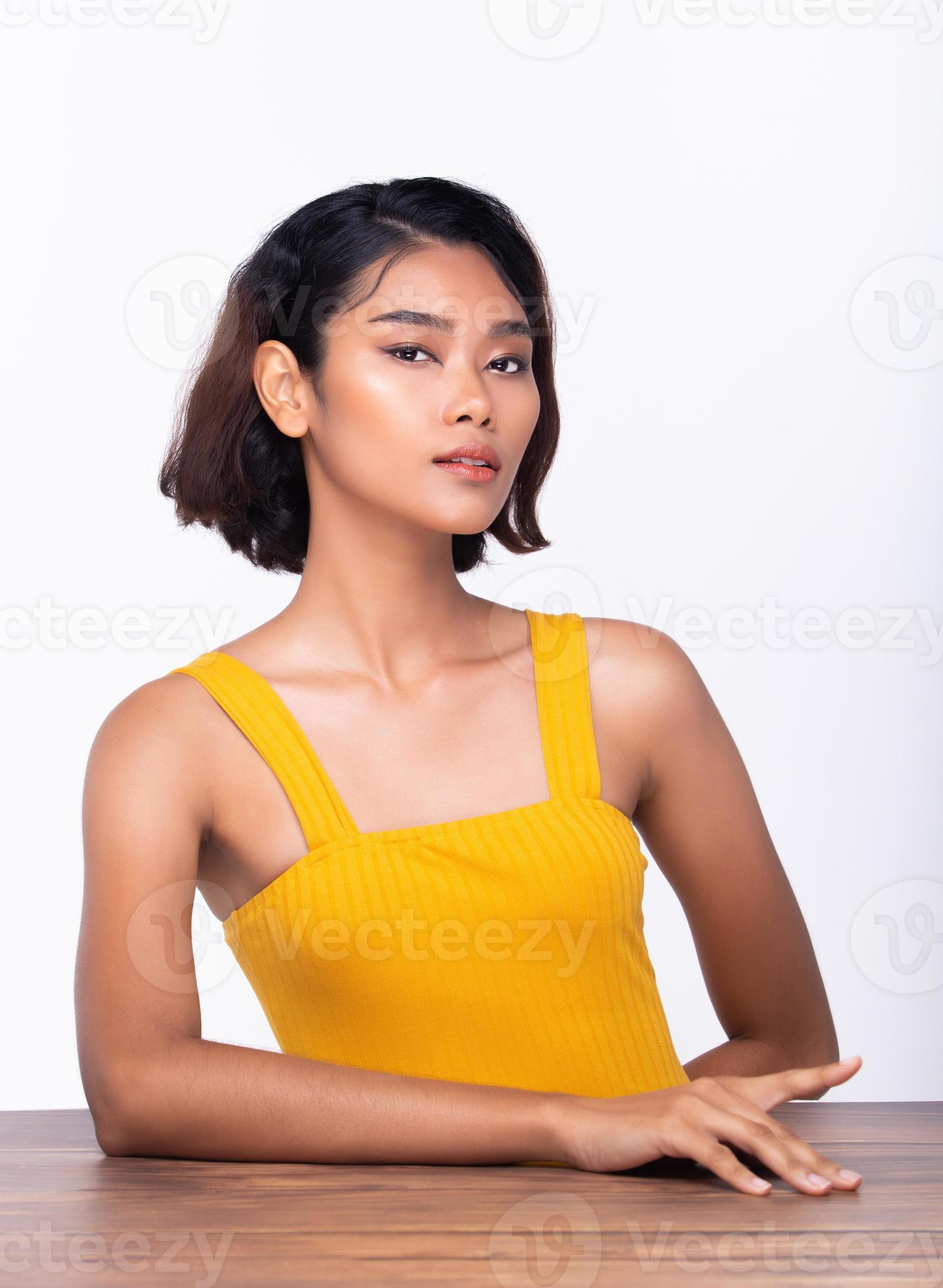 Beautiful Tanned Skin Woman Wear Yellow Dress Open Shoulder With Clean