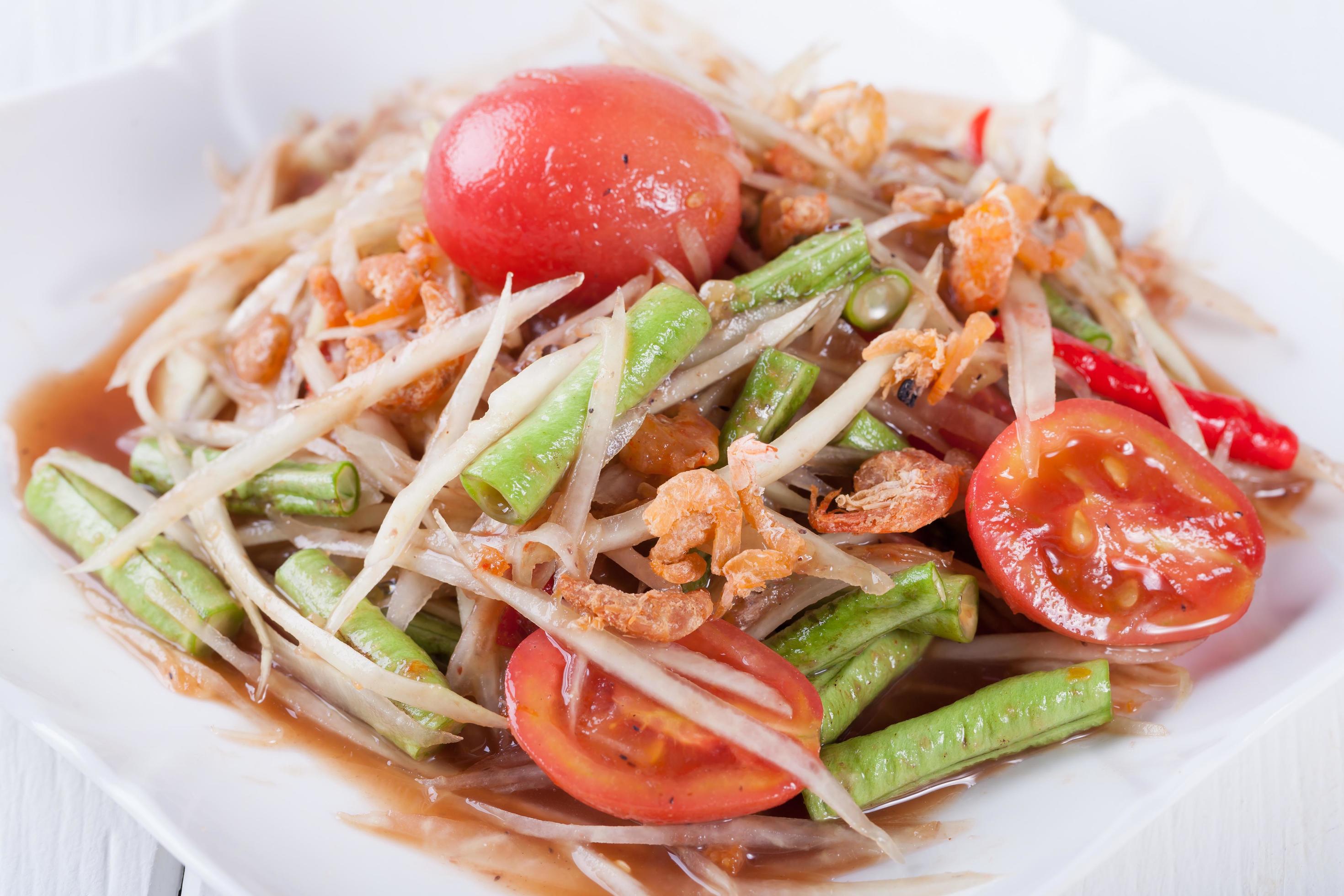 Somtum, papaya salad delicious food in thailand 11042838 Stock Photo at Vecteezy