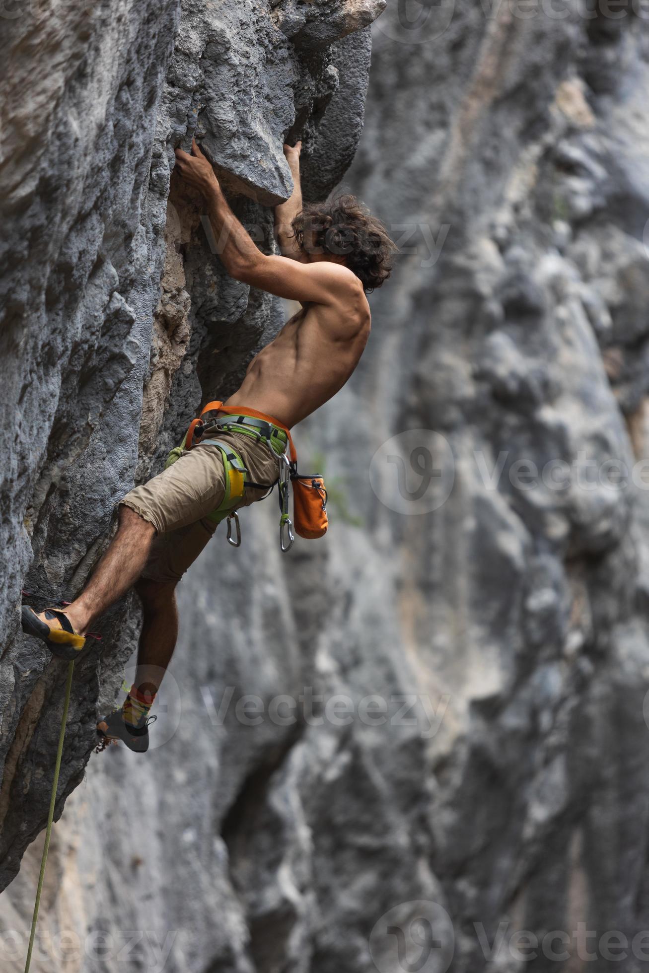 rock climber climbs the rock. 11082785 Stock Photo at Vecteezy