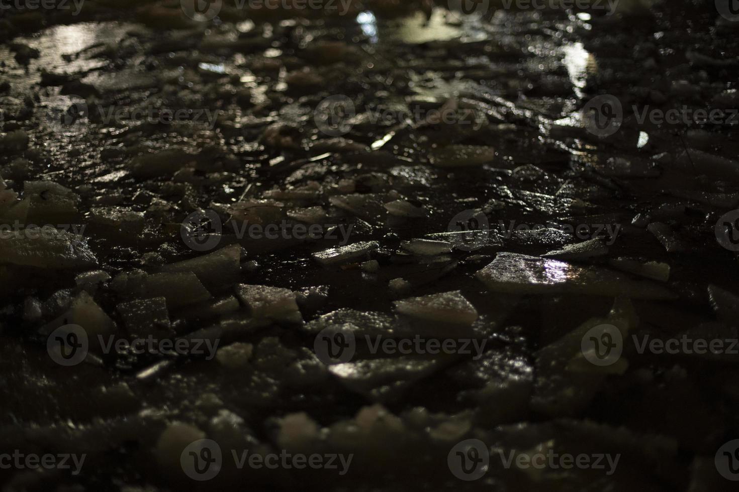 Texture of ice in dark. Broken ice. Puddle at night. 11145276 Stock Photo at Vecteezy