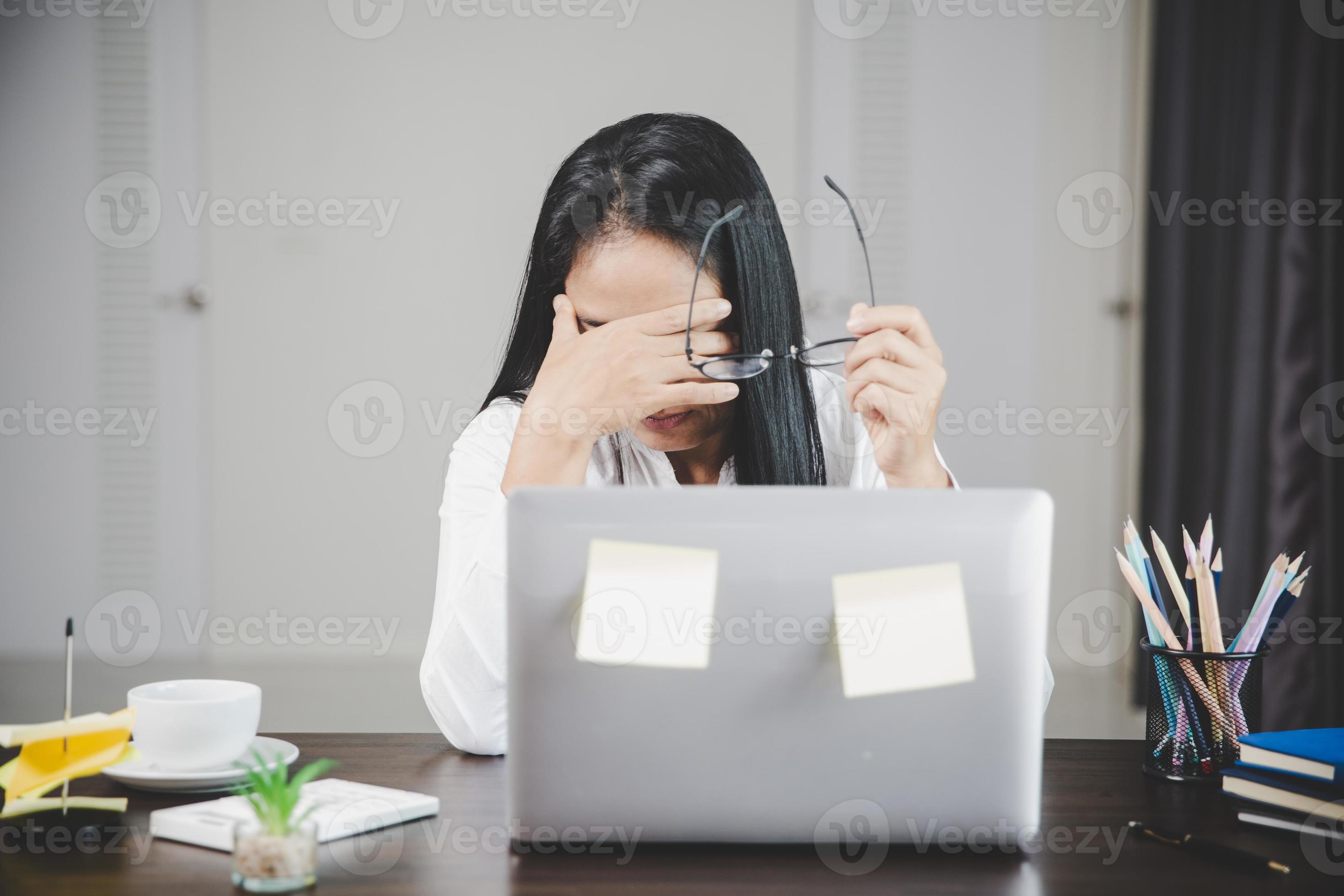 Young business woman person sleepy and has frustration eye problems ...
