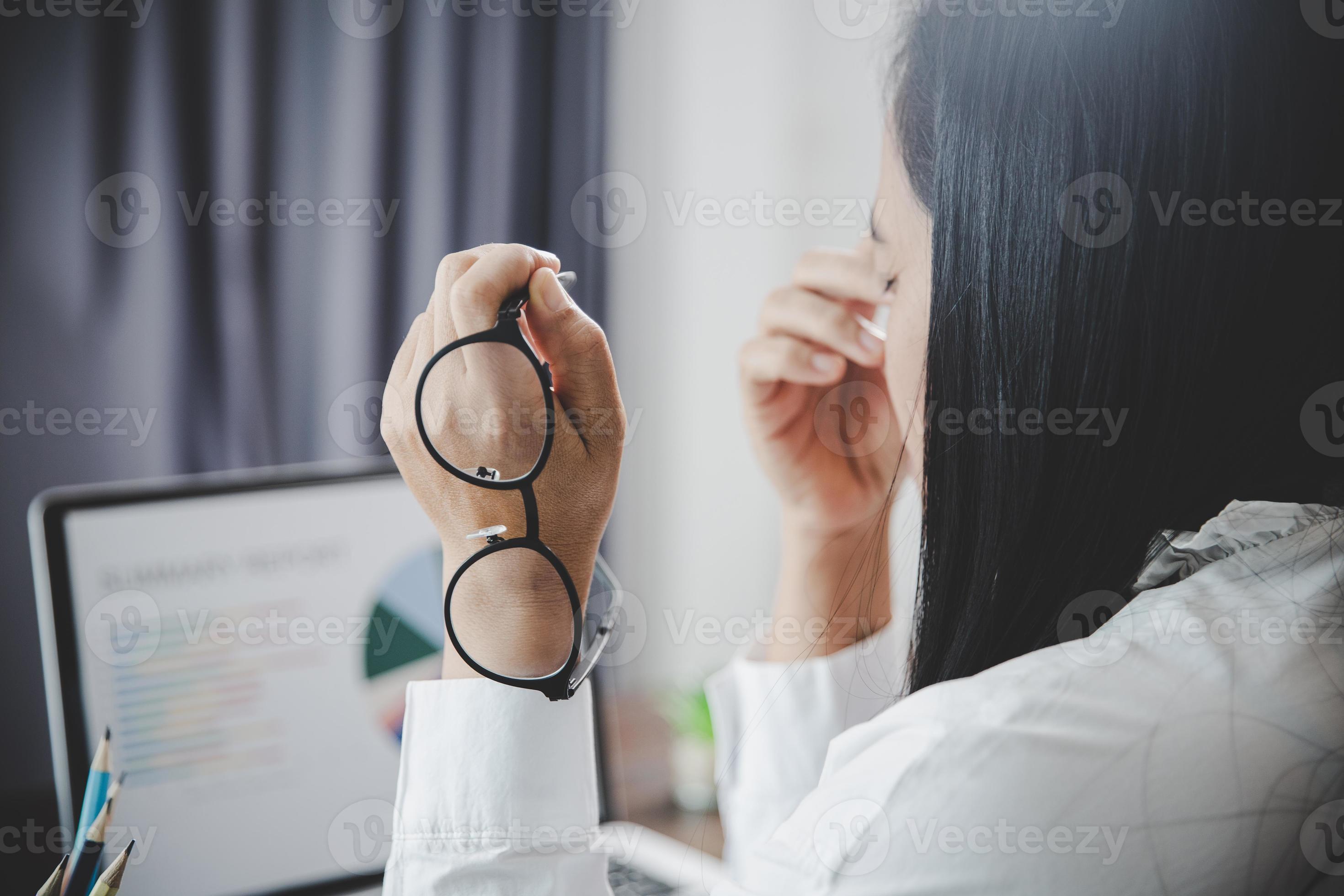 Young business woman person sleepy and has frustration eye problems ...