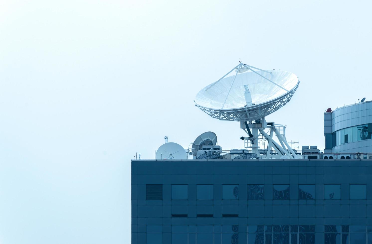 Large satellite dish on rooftop building 11174542 Stock Photo at Vecteezy