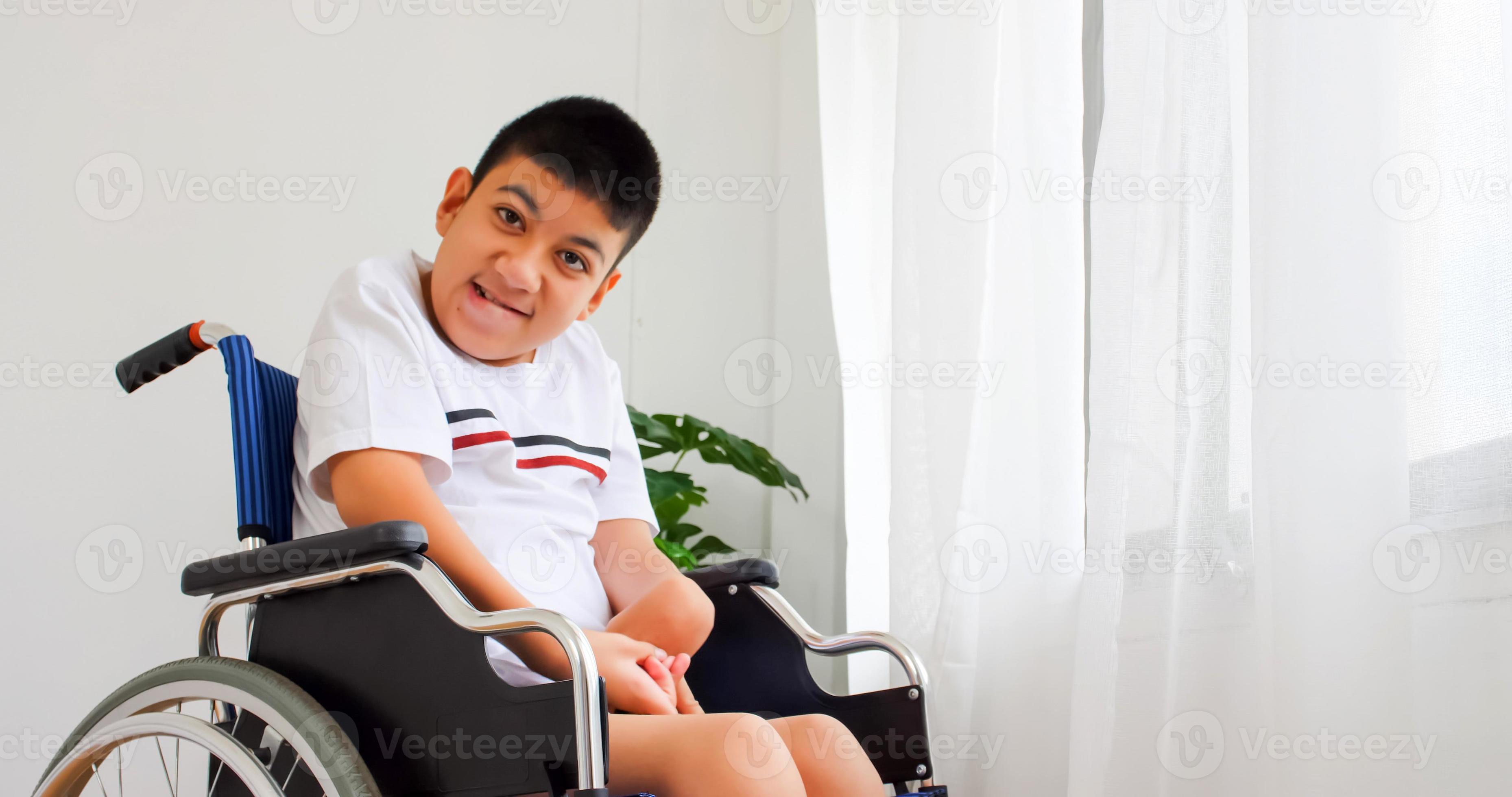 Disabled boy in a wheelchair. 11275783 Stock Photo at Vecteezy