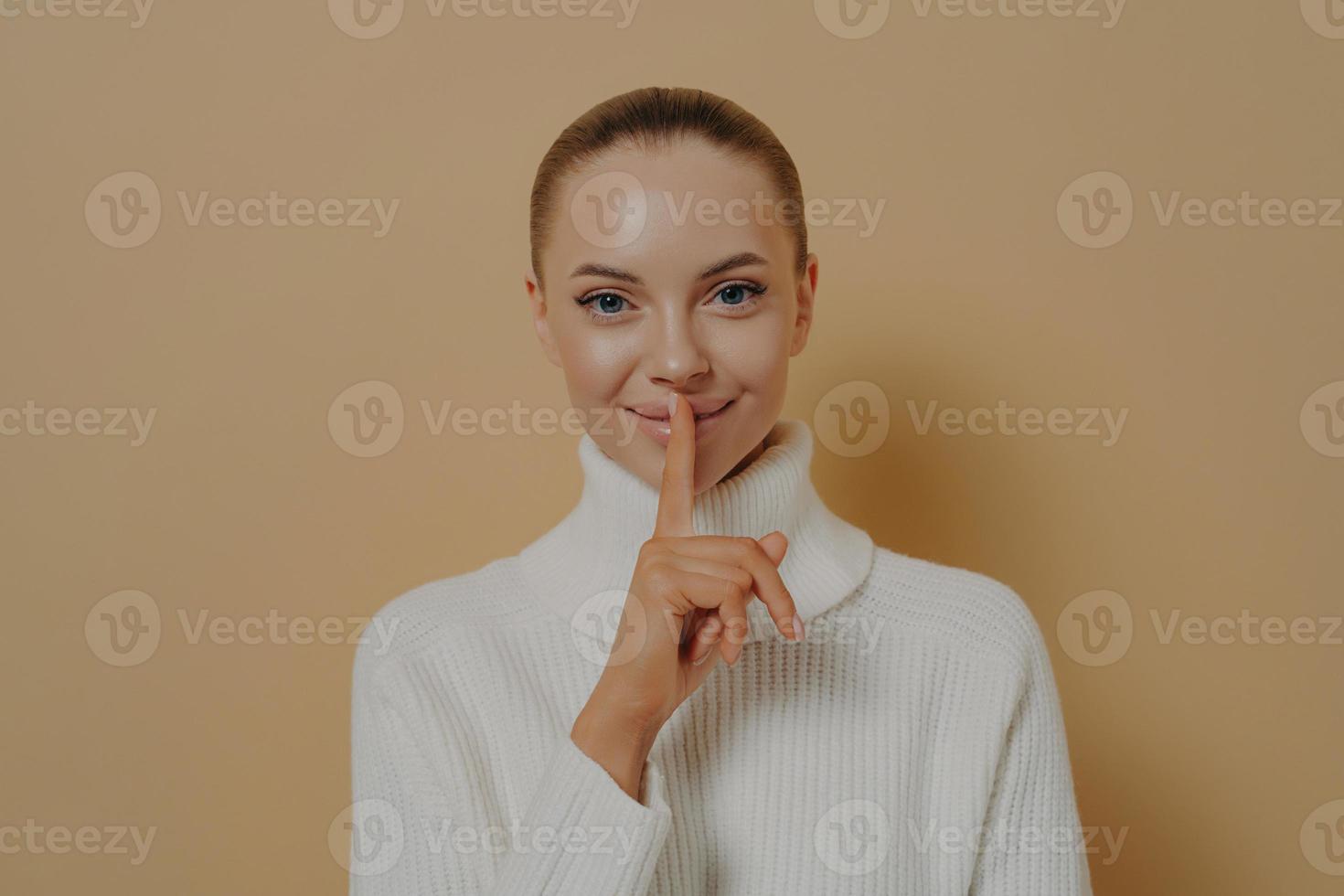 Keep It Secret Young Attractive Smiling Lady Saying Be Quiet With Finger On Lips Isolated On