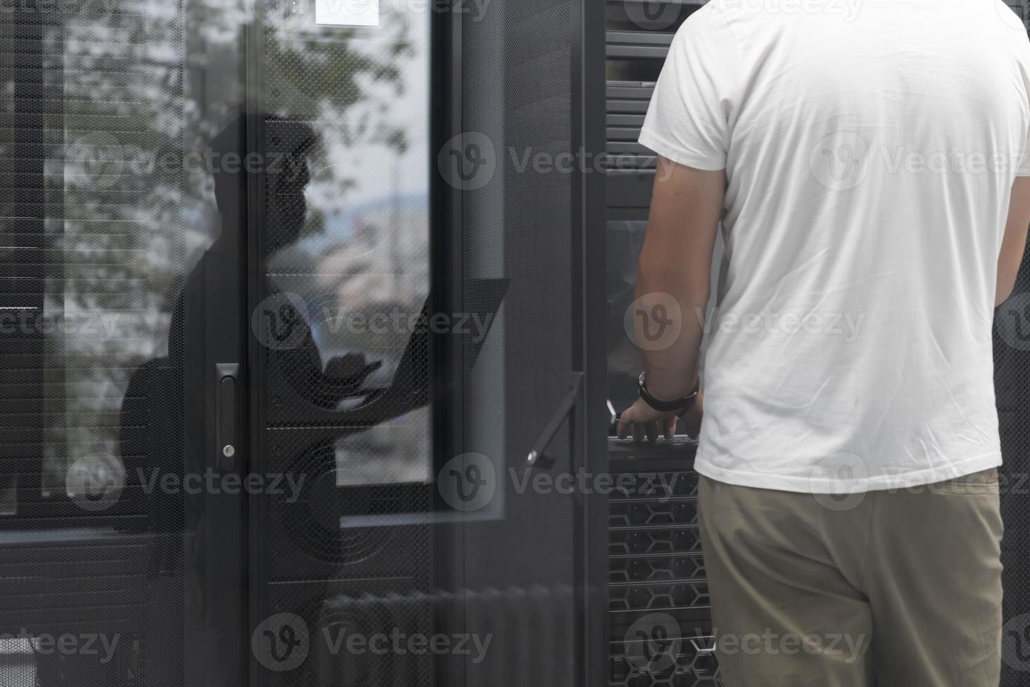 Data Center Engineer Using Laptop Computer Server Room Specialist Facility With Korean Male