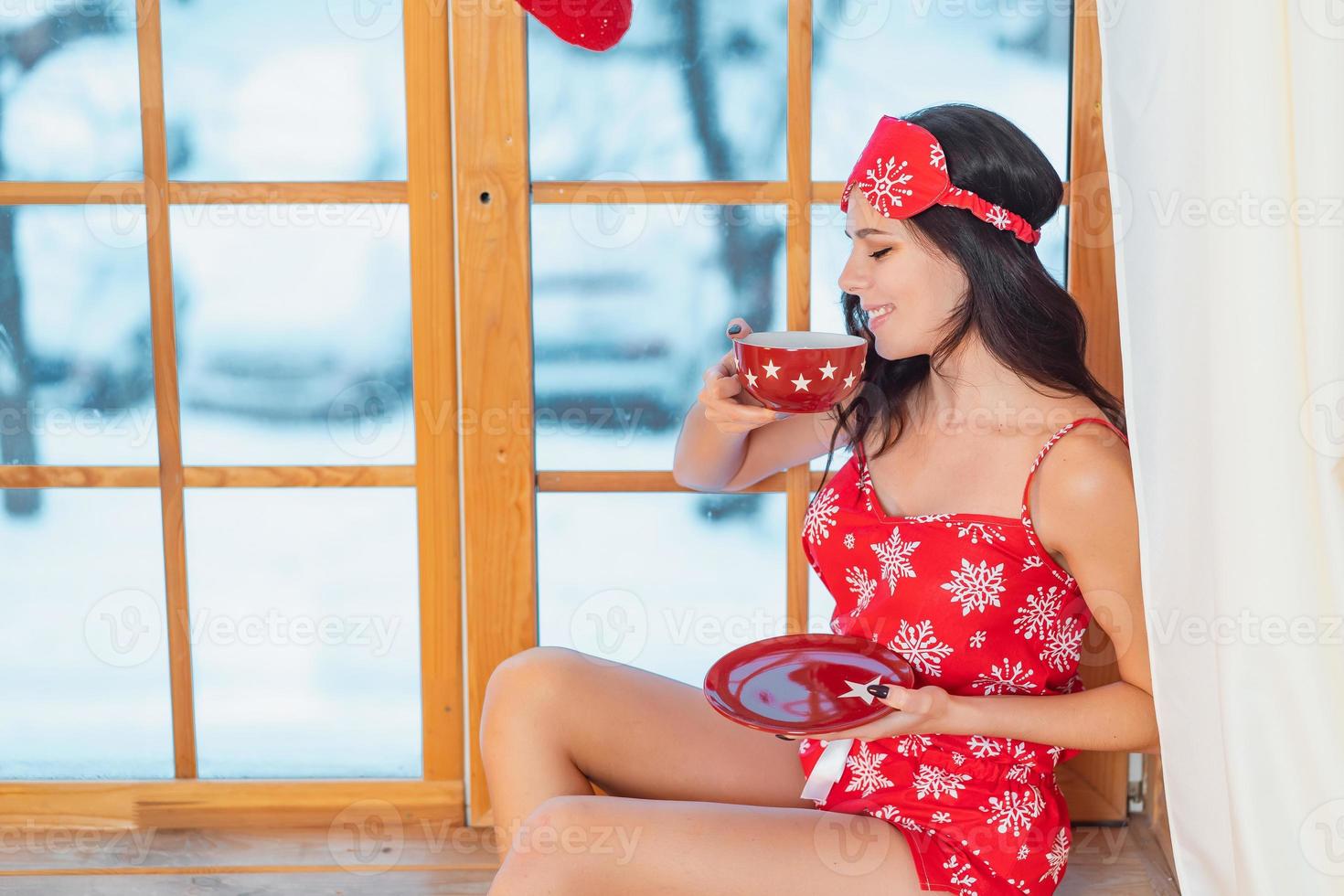 Beautiful Young Brunette Woman Wearing Red Pajamas Sitting Home By The