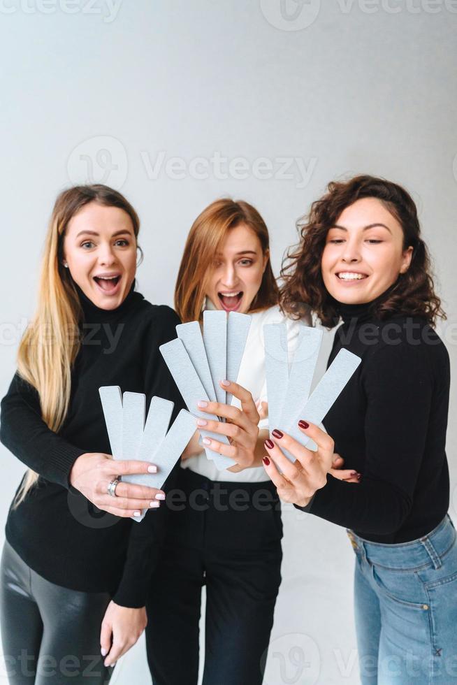 Three beautiful young girls posing for the camera 11463618 Stock Photo ...