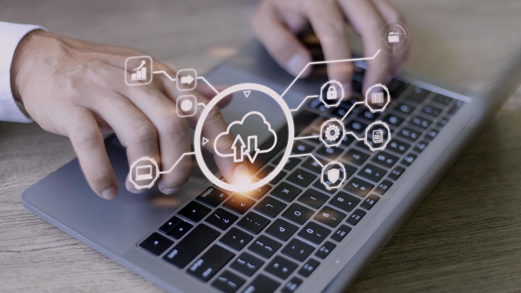 man use Laptop with cloud computing diagram show on hand. Cloud technology. Data storage ...