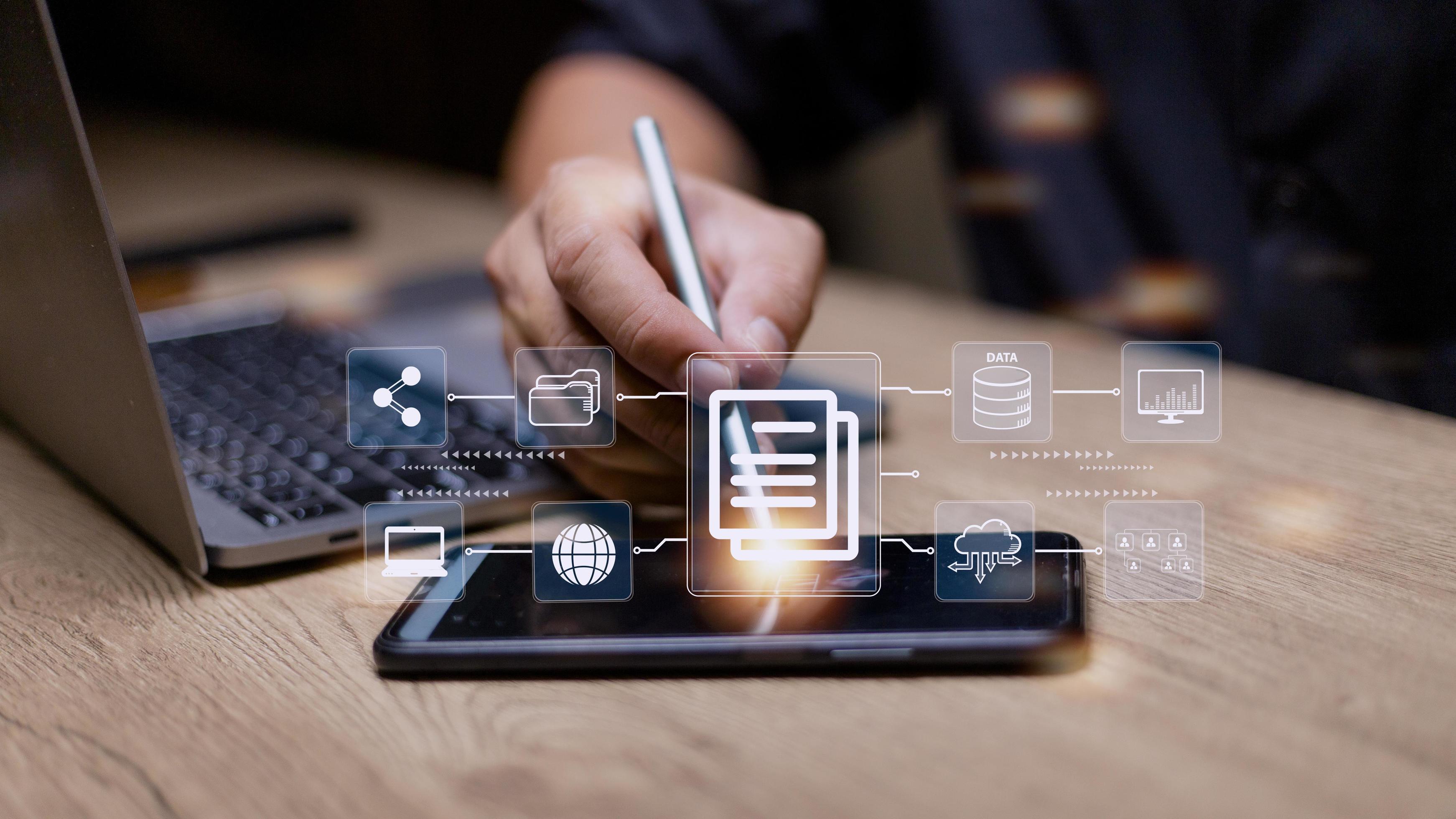 Businessman using a computer to document management concept, online ...