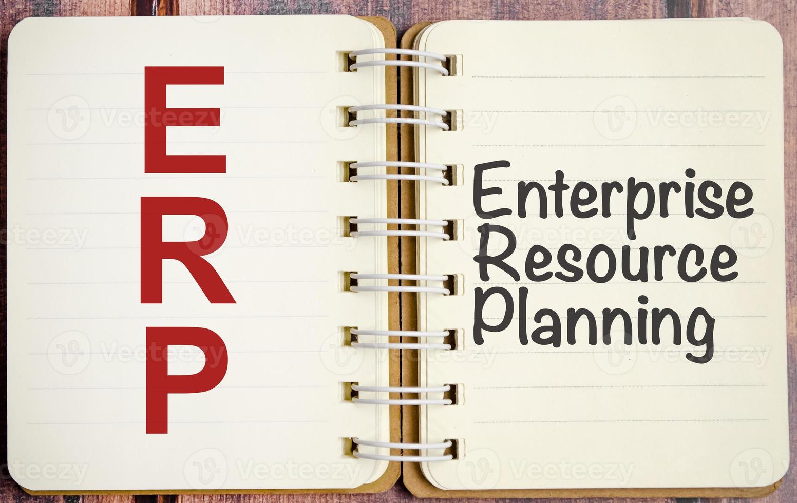 erp - enterprise resource planning words on notebook 11649155 Stock Photo at Vecteezy