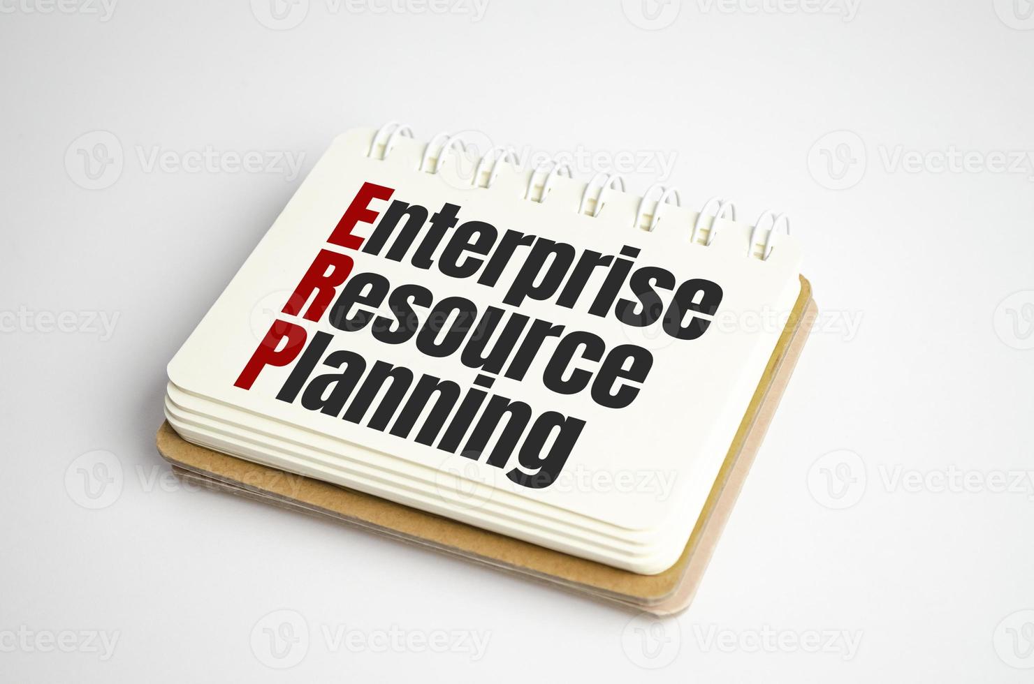 erp - enterprise resource planning words on notebook 11649412 Stock Photo at Vecteezy