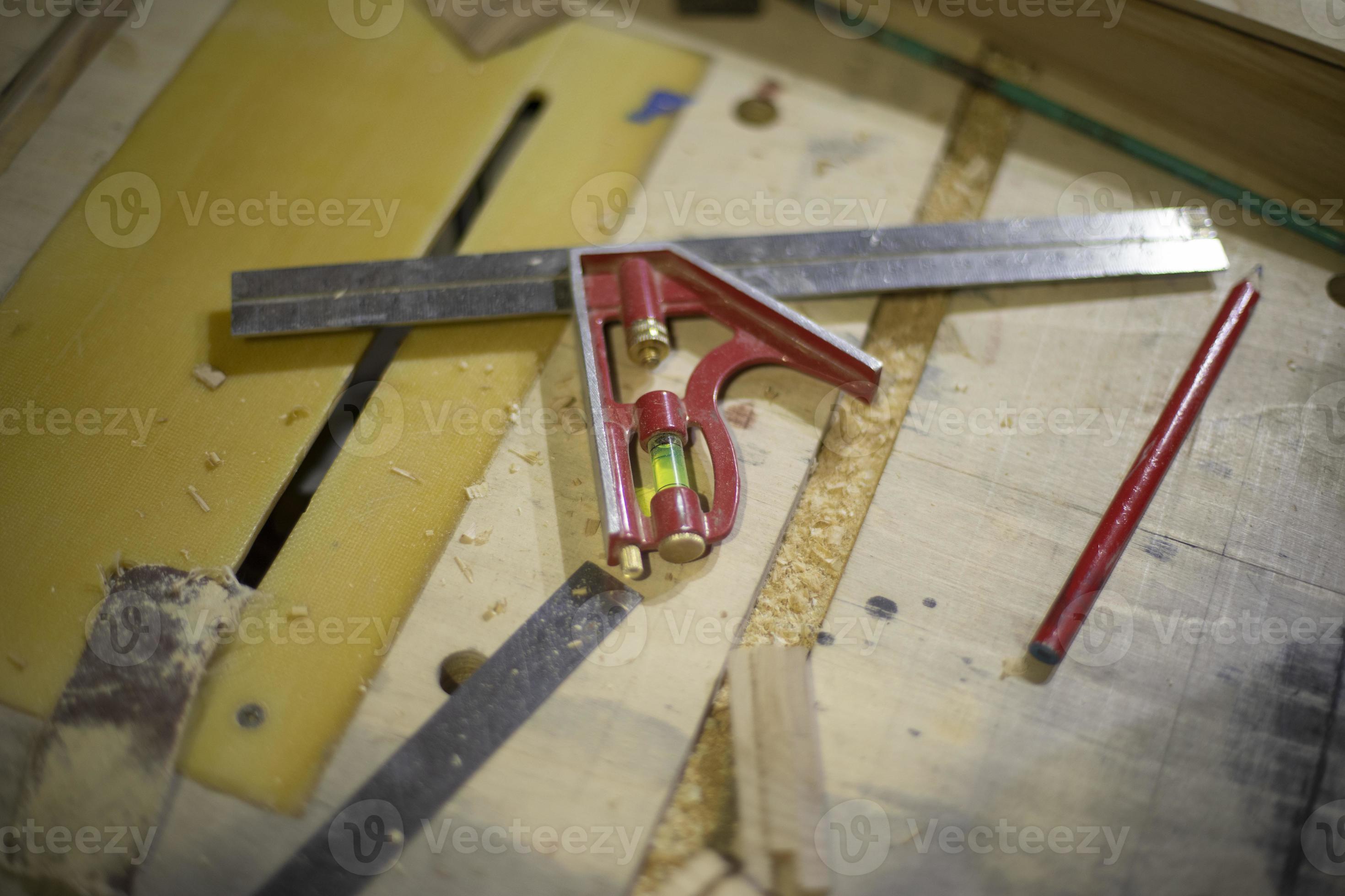 Line and level in workshop. Tool for measurements. Details of carpentry ...