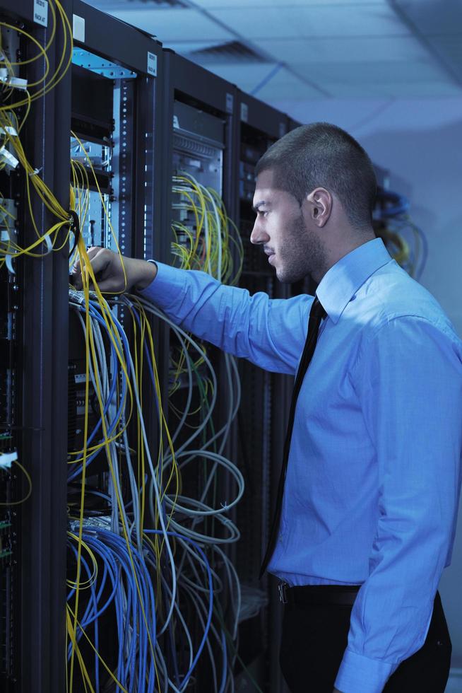 Young It Engineer In Datacenter Server Room 11807911 Stock Photo At young-it-engineer-in-datacenter-server-room-11807911-stock-photo-at
