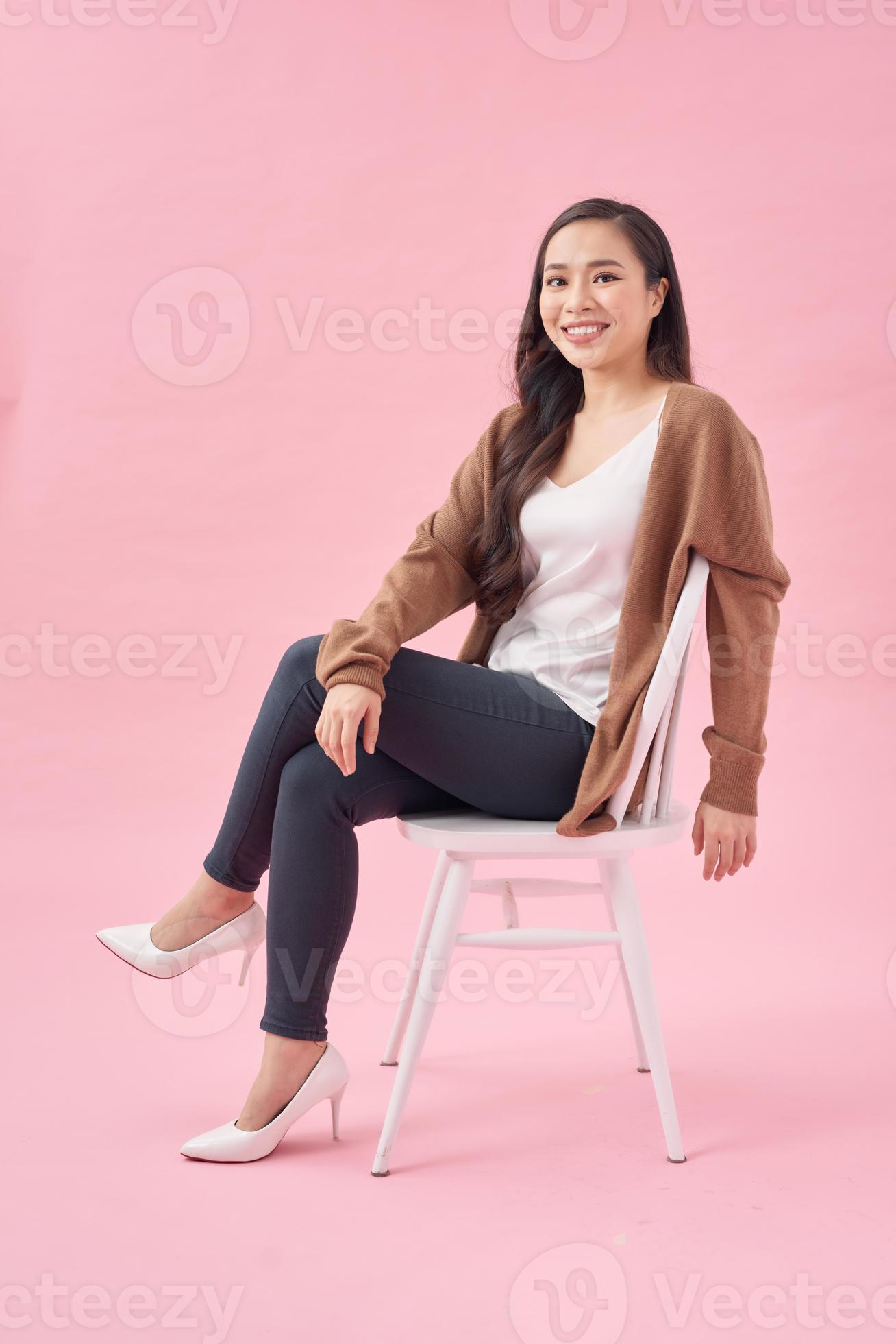 She is simply gorgeous. Beautiful young woman posing and looking away ...