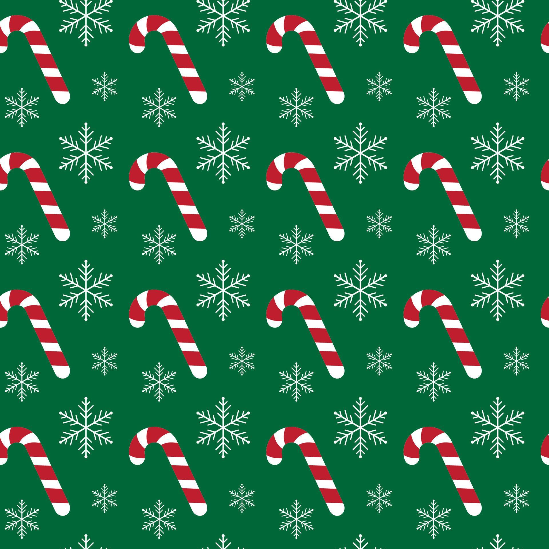 Christmas seamless pattern with candy canes and snowflakes on green ...