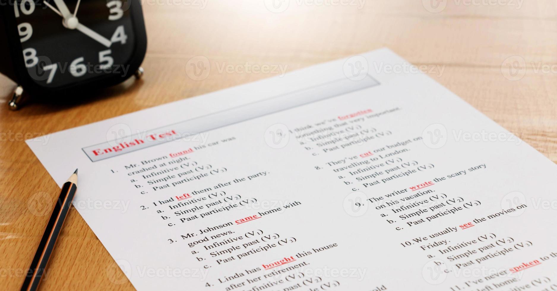 english exam on table with pencil 11842440 Stock Photo at Vecteezy
