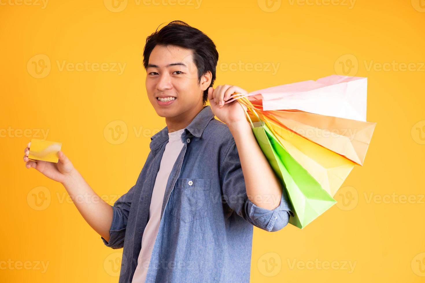 image of asian man posing on a yellow background 11869350 Stock Photo ...