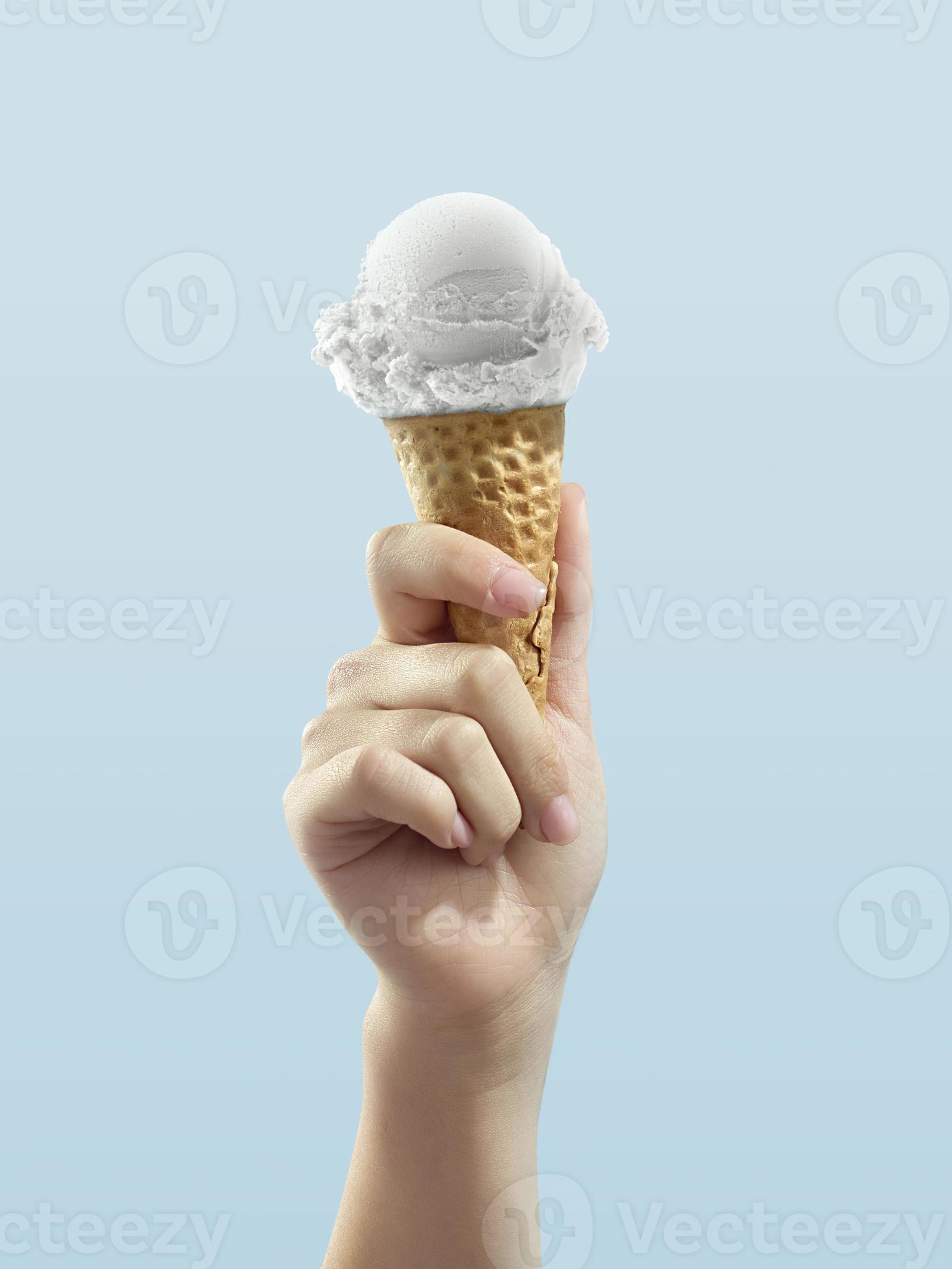 Ice Cream Cone On Blue Background Woman Holding Ice Cream By Hand