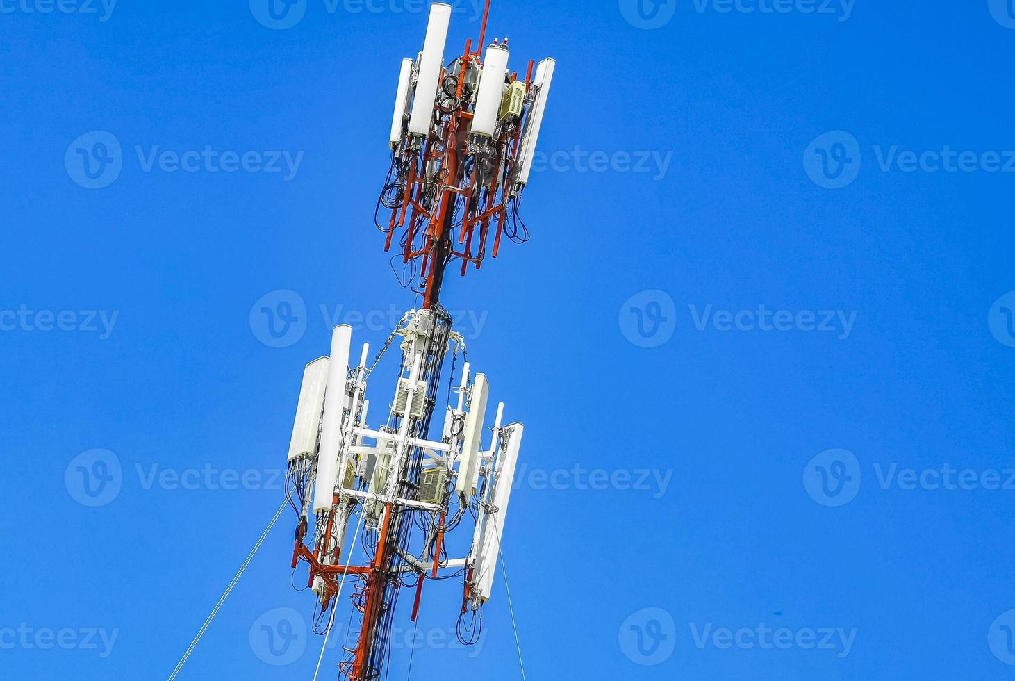 Red white 5G tower radiation in Playa del Carmen Mexico. 11900926 Stock Photo at Vecteezy